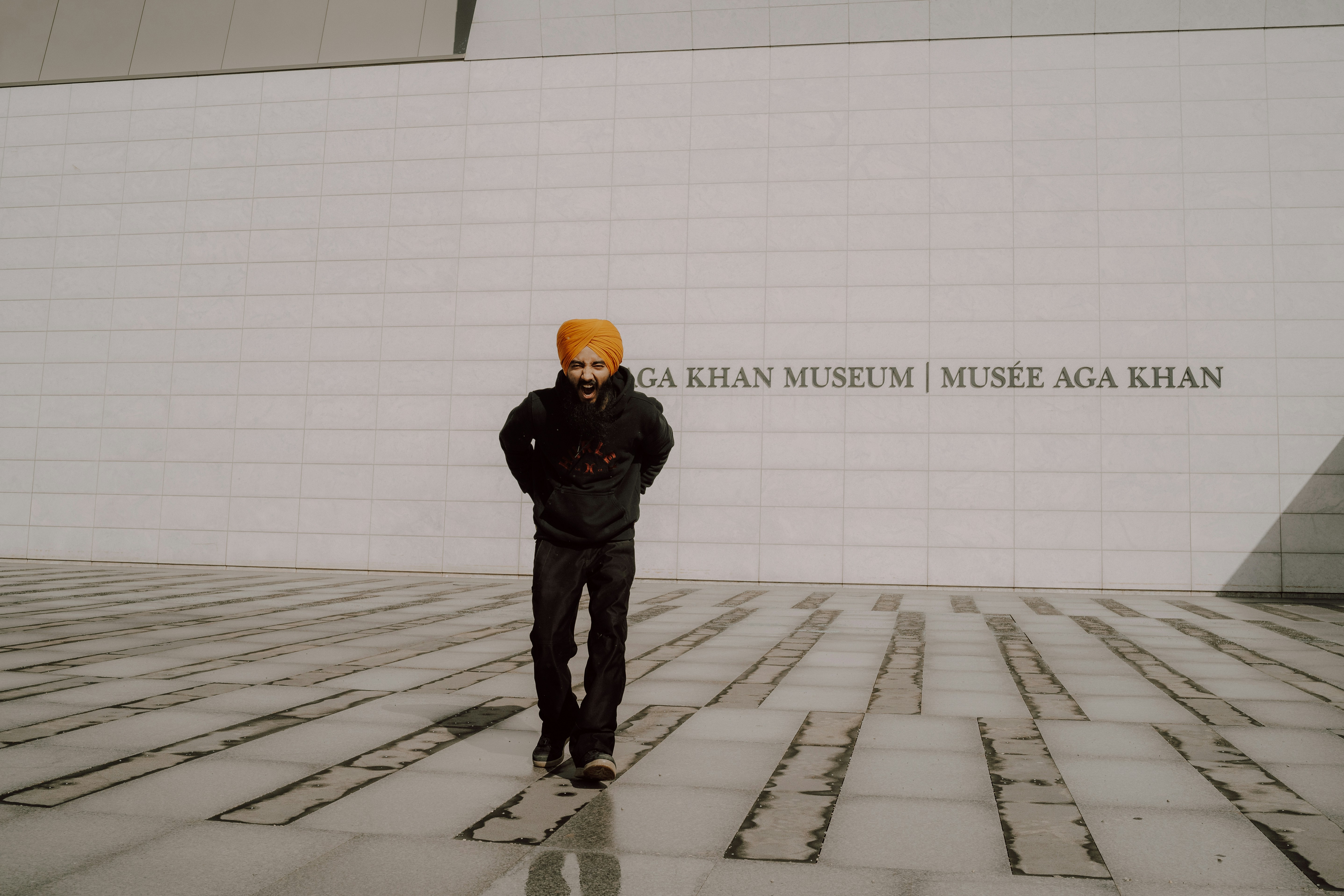 Turbaned Silhouette Before a Monolithic Aga Khan Museum Wall