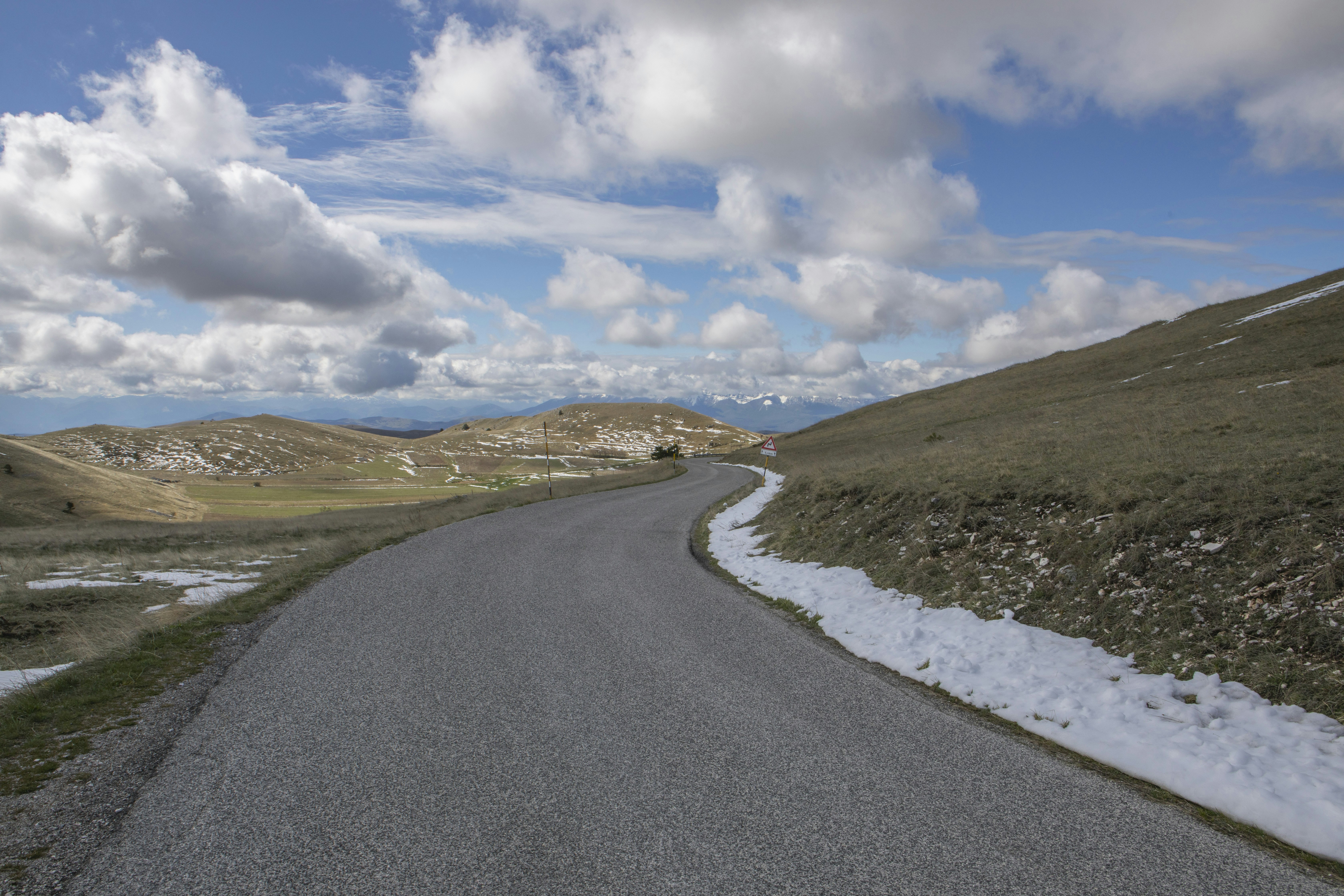 Curved Mountain Road into the Sky