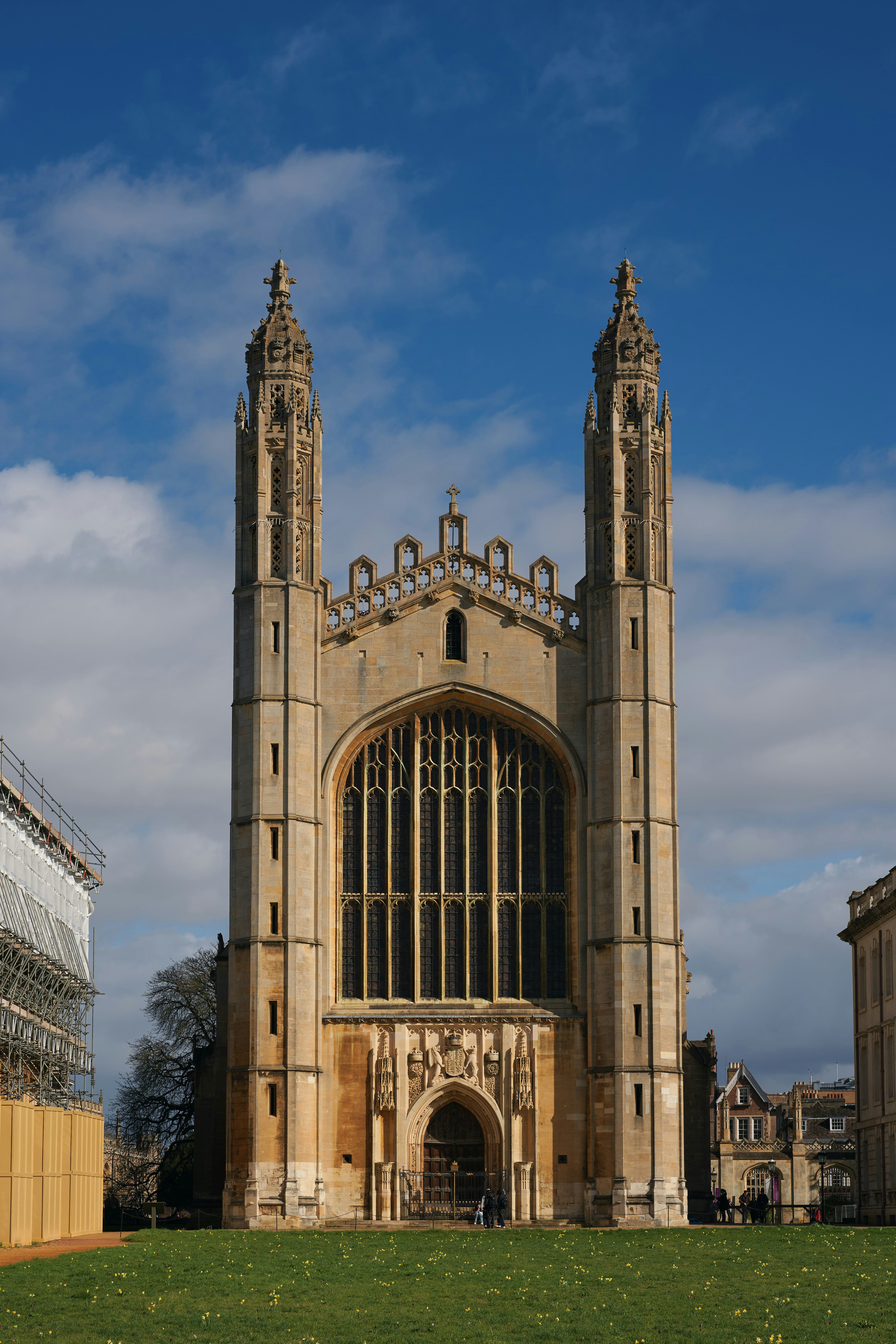 A large building with a clock tower on the front of it photo – Free ...