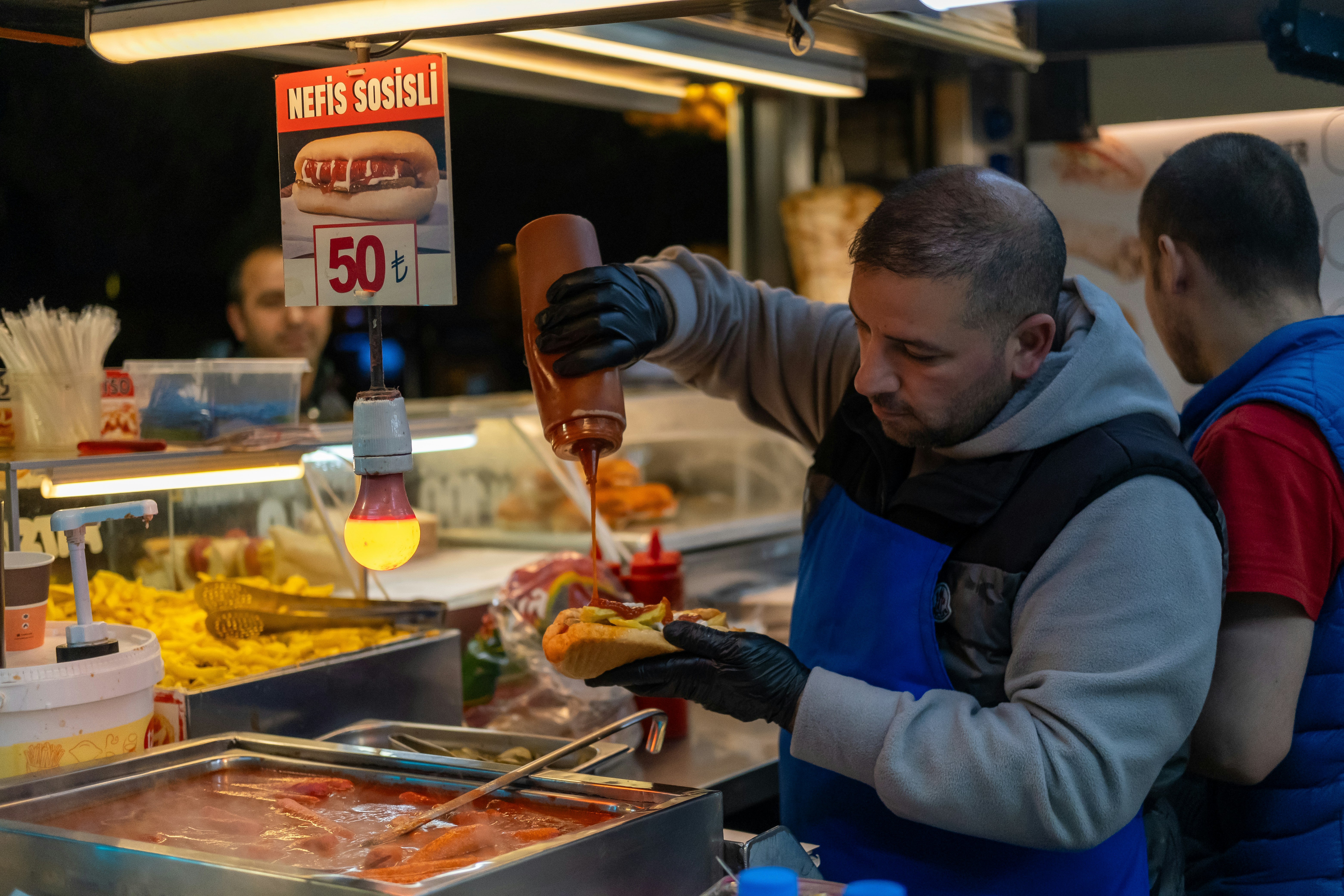 Sauce Master at a Neon Turkish Street Grill