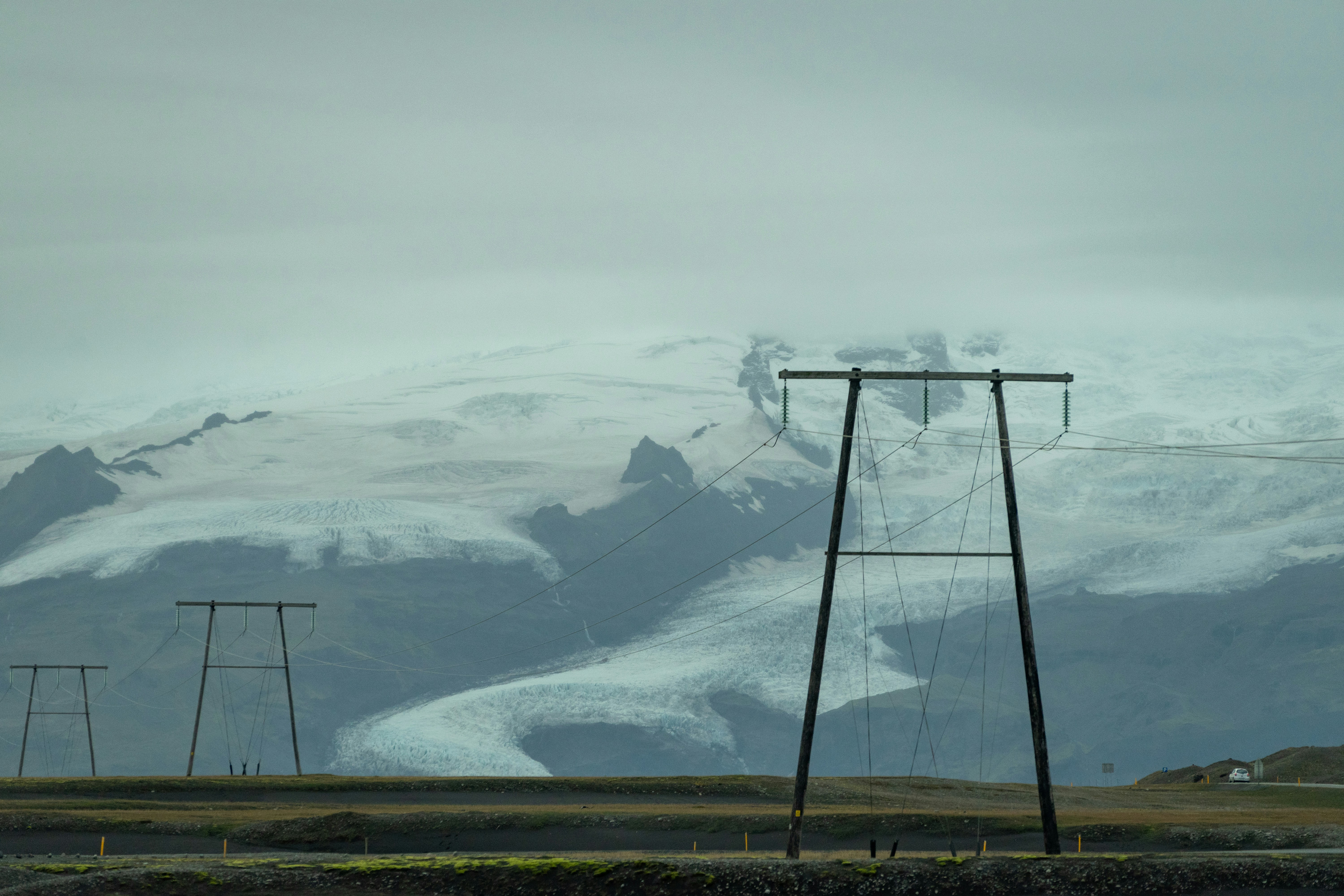 Power lines in a filed, South Iceland