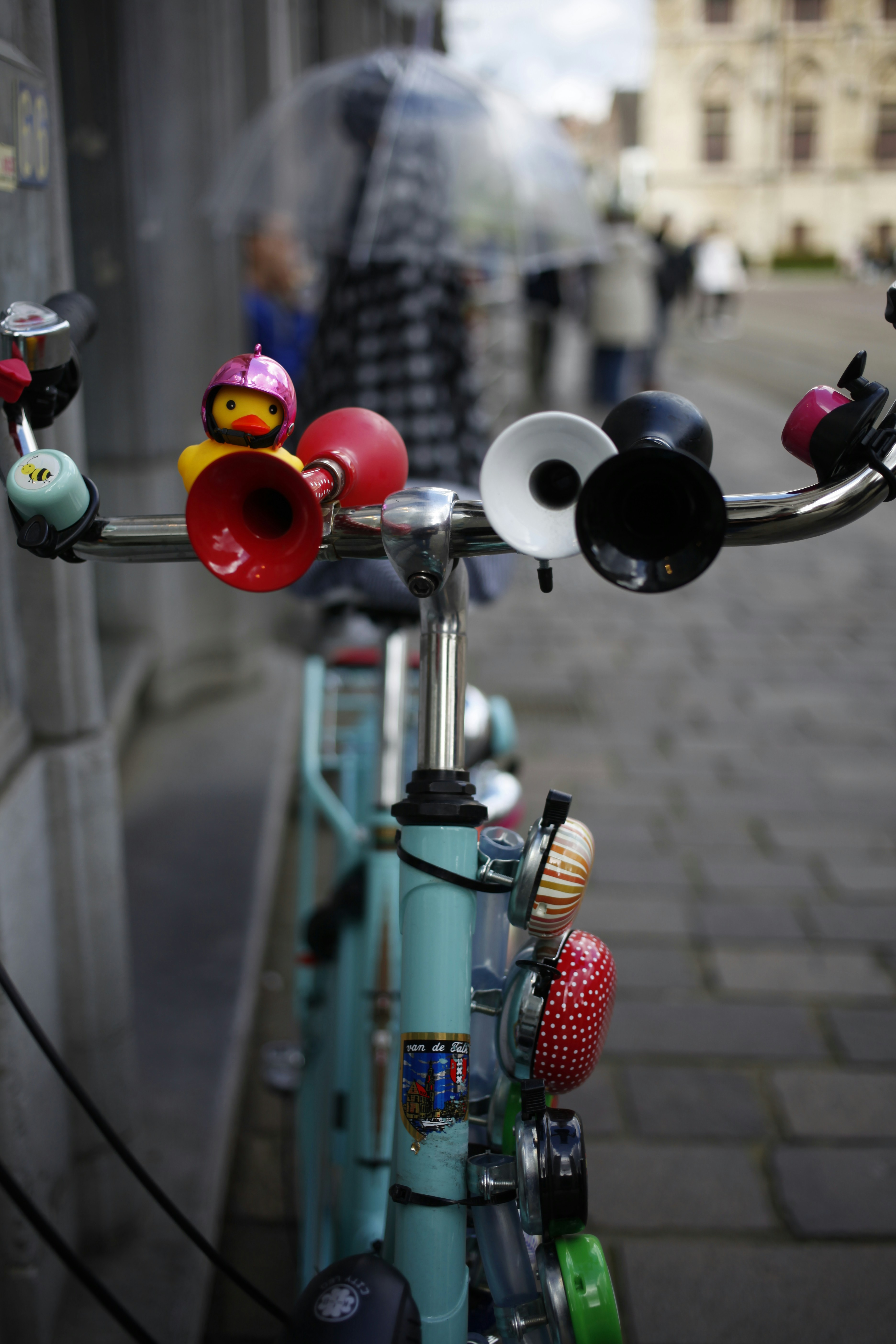 A blue bike with a lot of decorations on the handlebars photo – Free ...