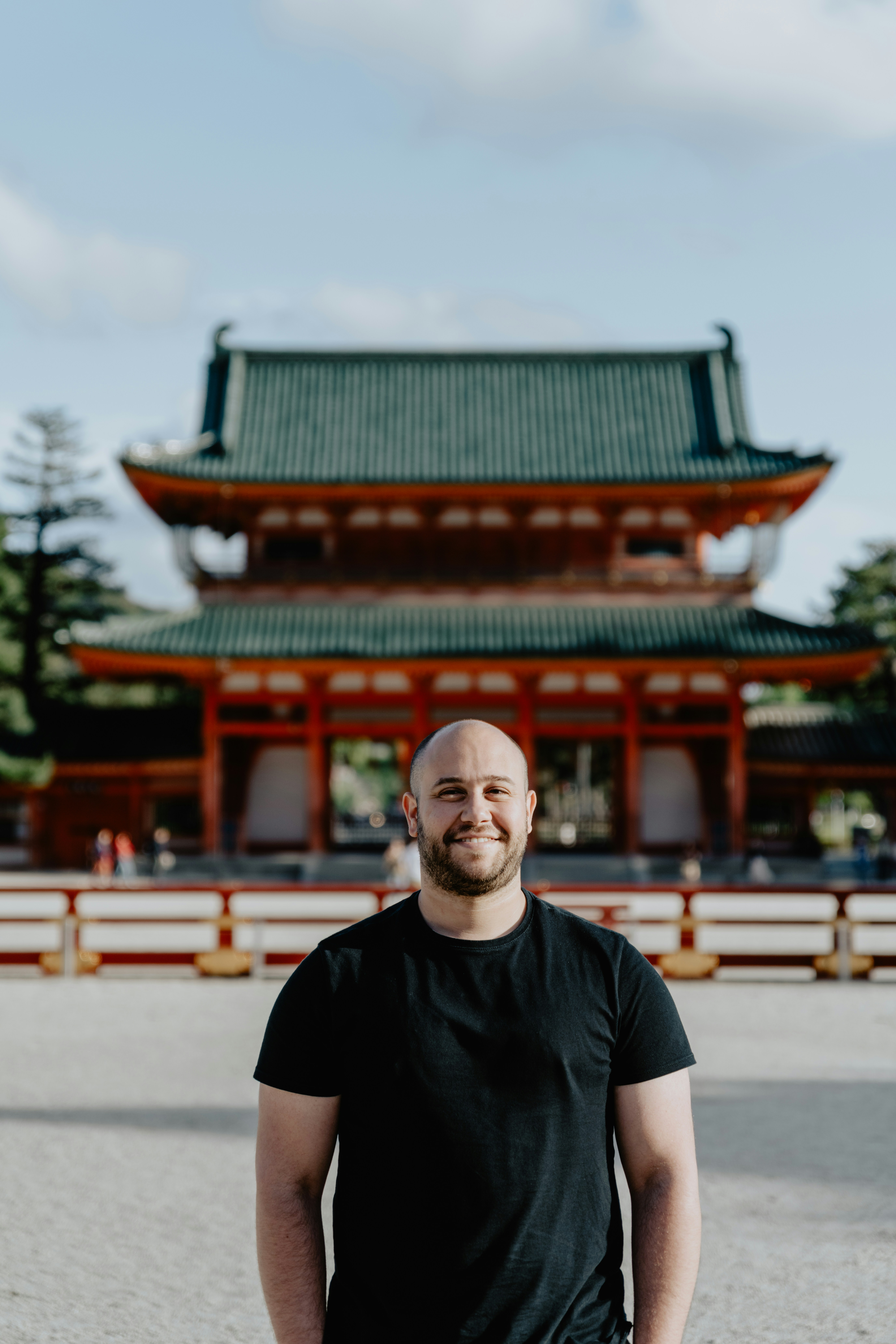 Portrait Before the Red Gate: A Quiet Moment with the Temple