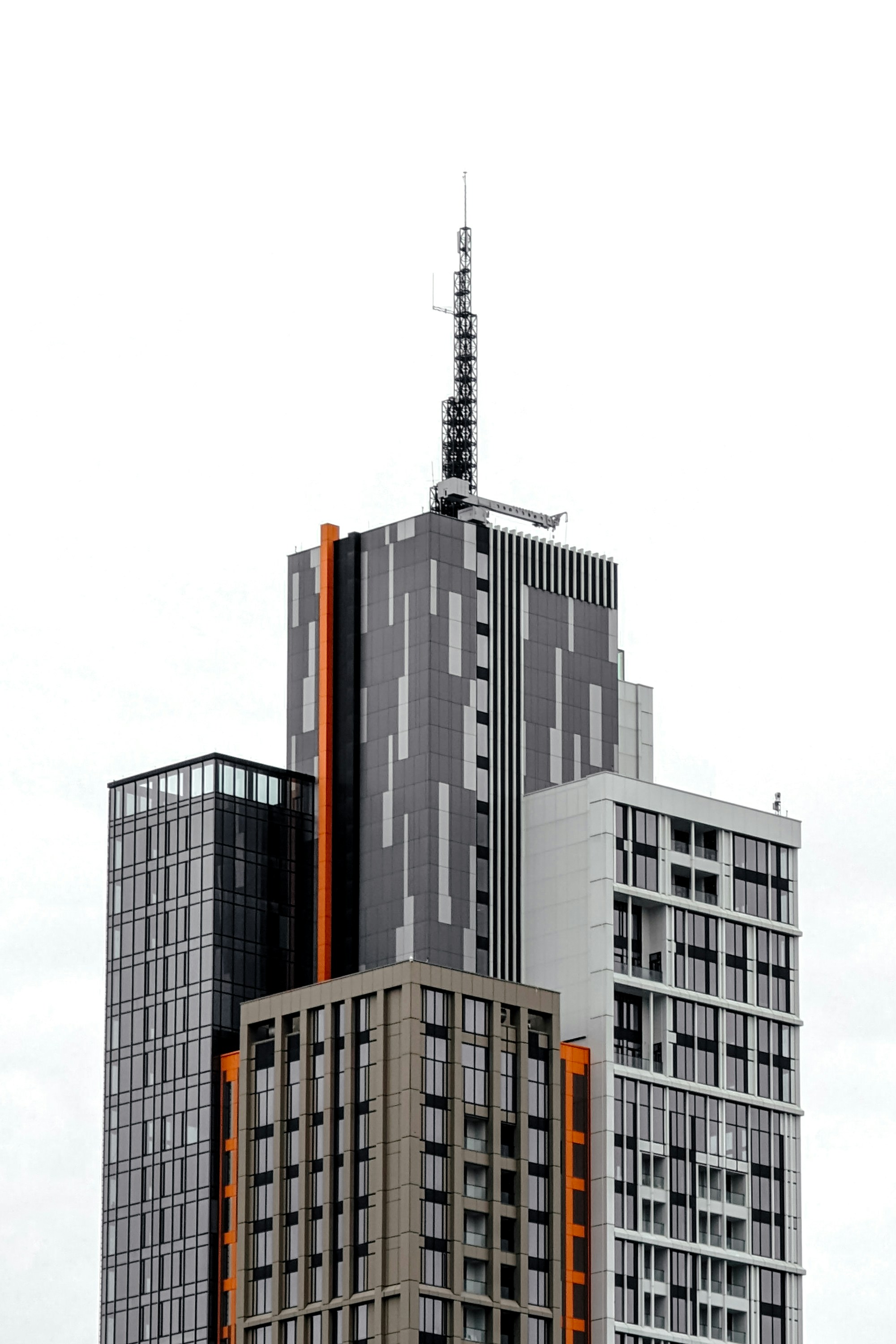Orange-Lined Titan: A Modern Skyscraper Reaching for the Sky