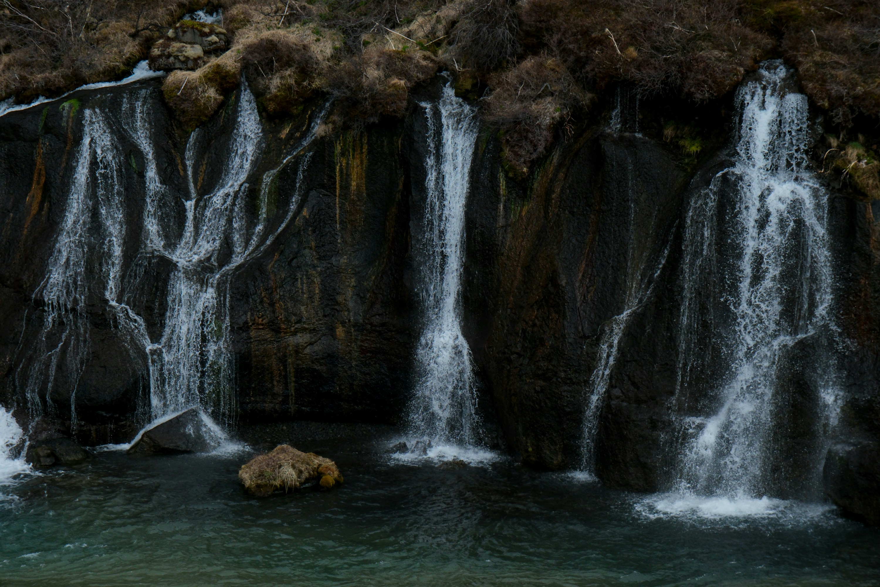 A group of waterfalls in a body of water photo – Free Iceland Image on ...