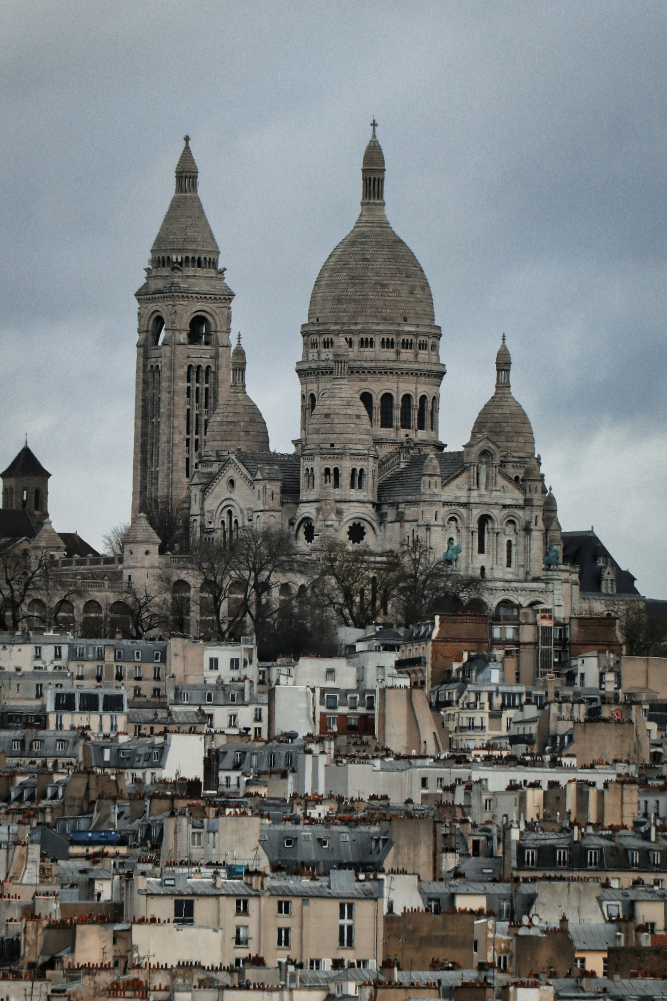 Montmartre Crown: Sacré-Cœur Rises Over Paris's Rooftop Sea
