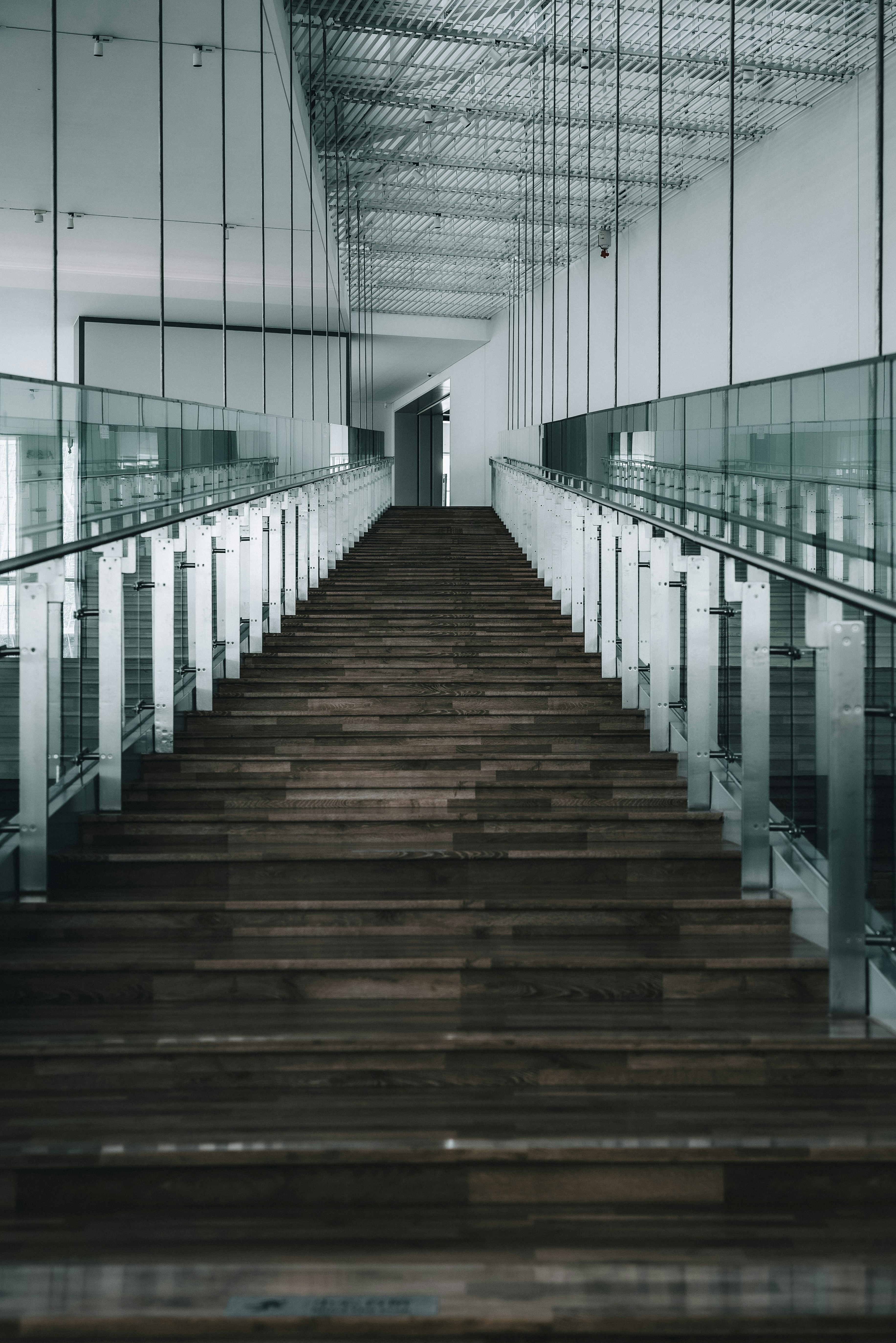 A very long set of stairs in a building photo – Free Grey Image on Unsplash