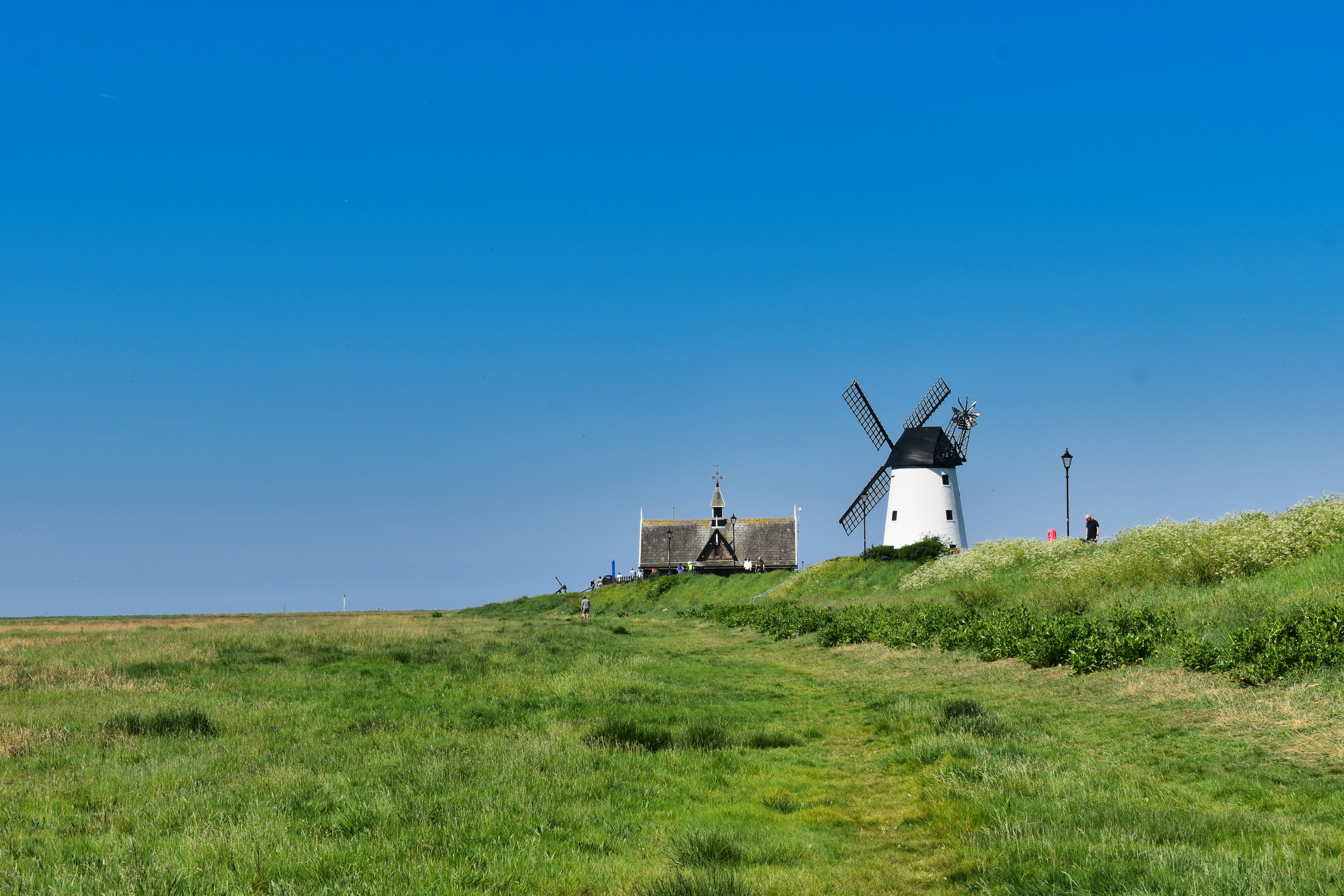 Serene Windmill Against a Vibrant Sky