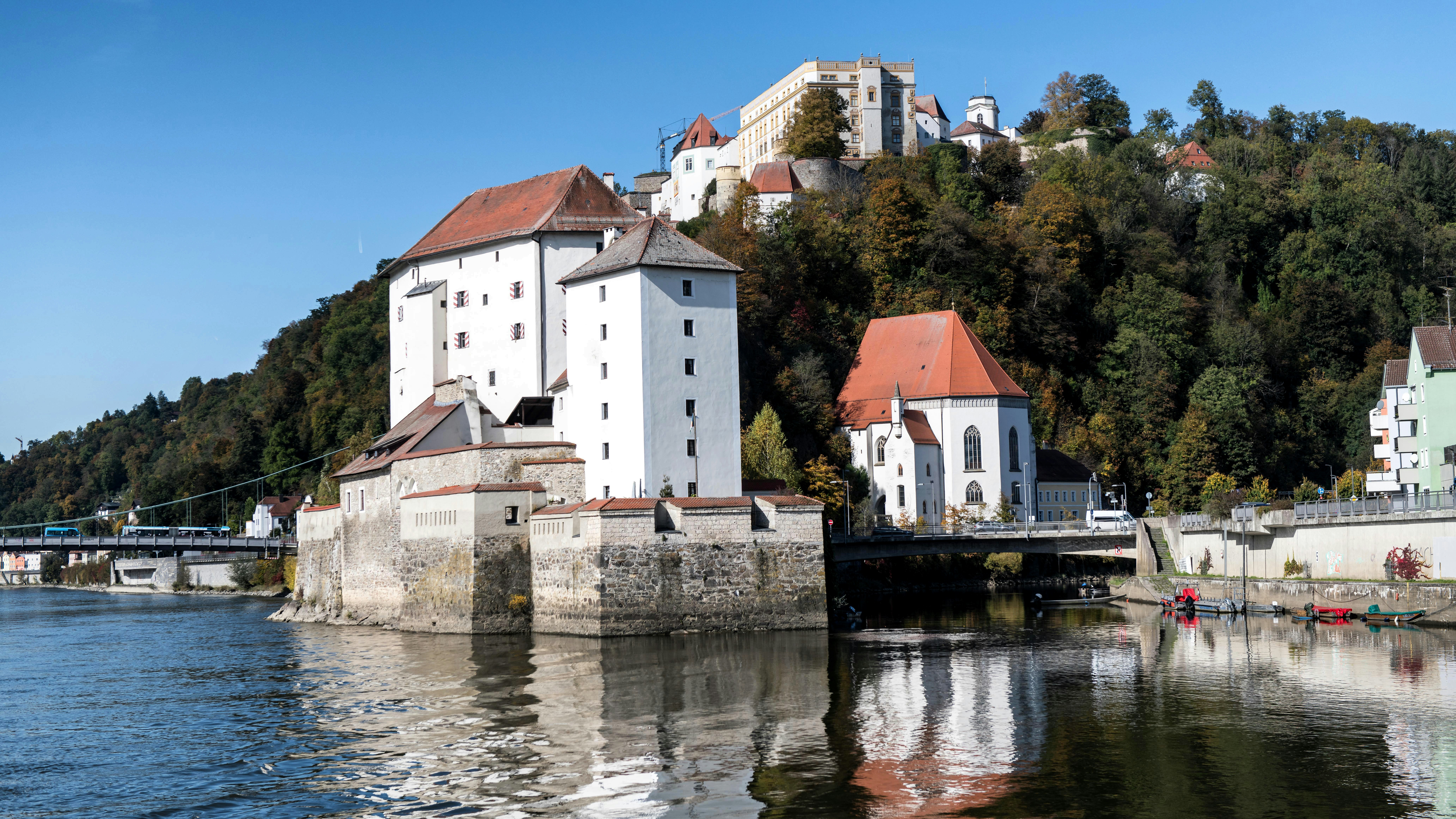 Riverside Fortification Amid Autumn Hues