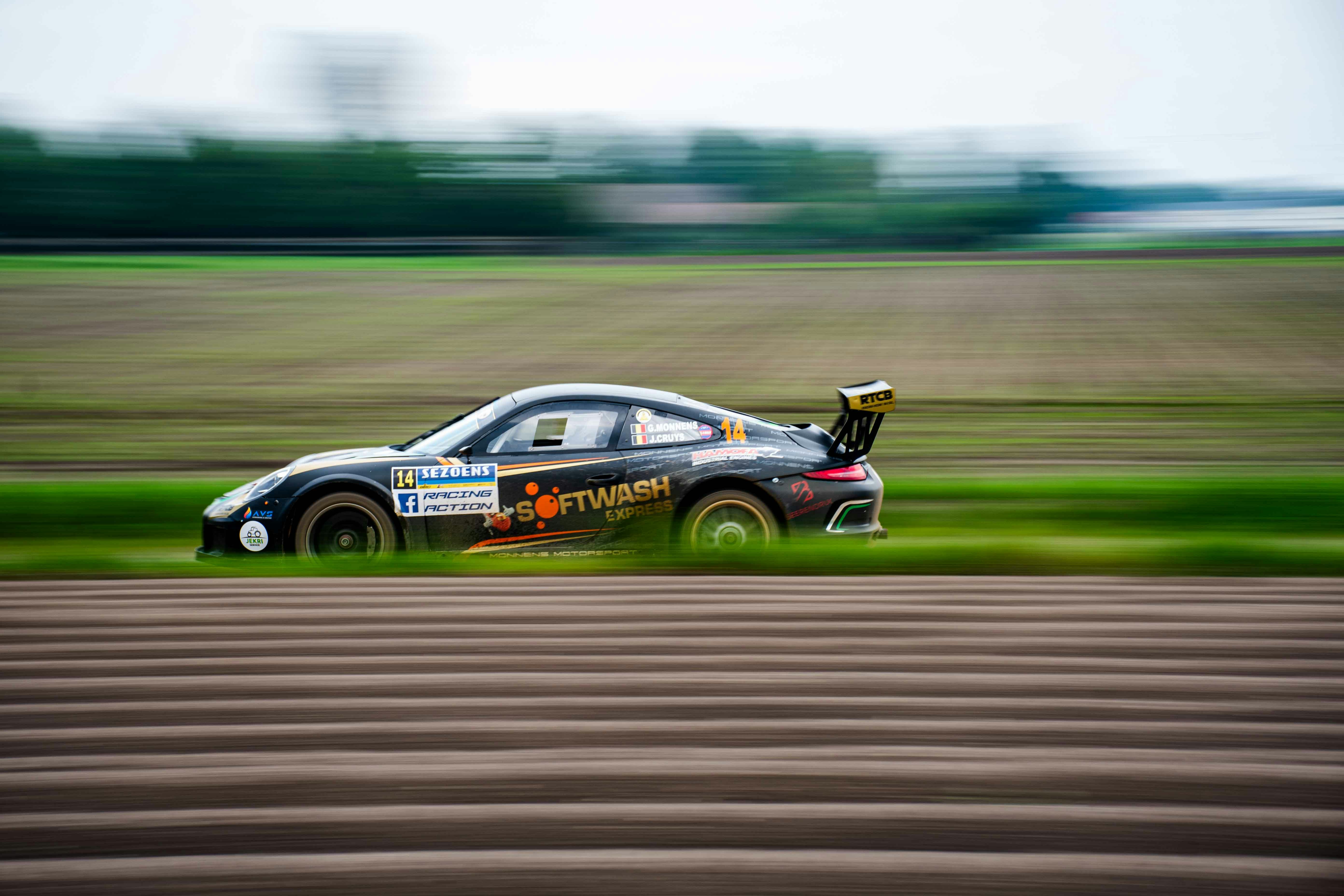 Black Lightning on the Track: Sponsor-Liveried Blur