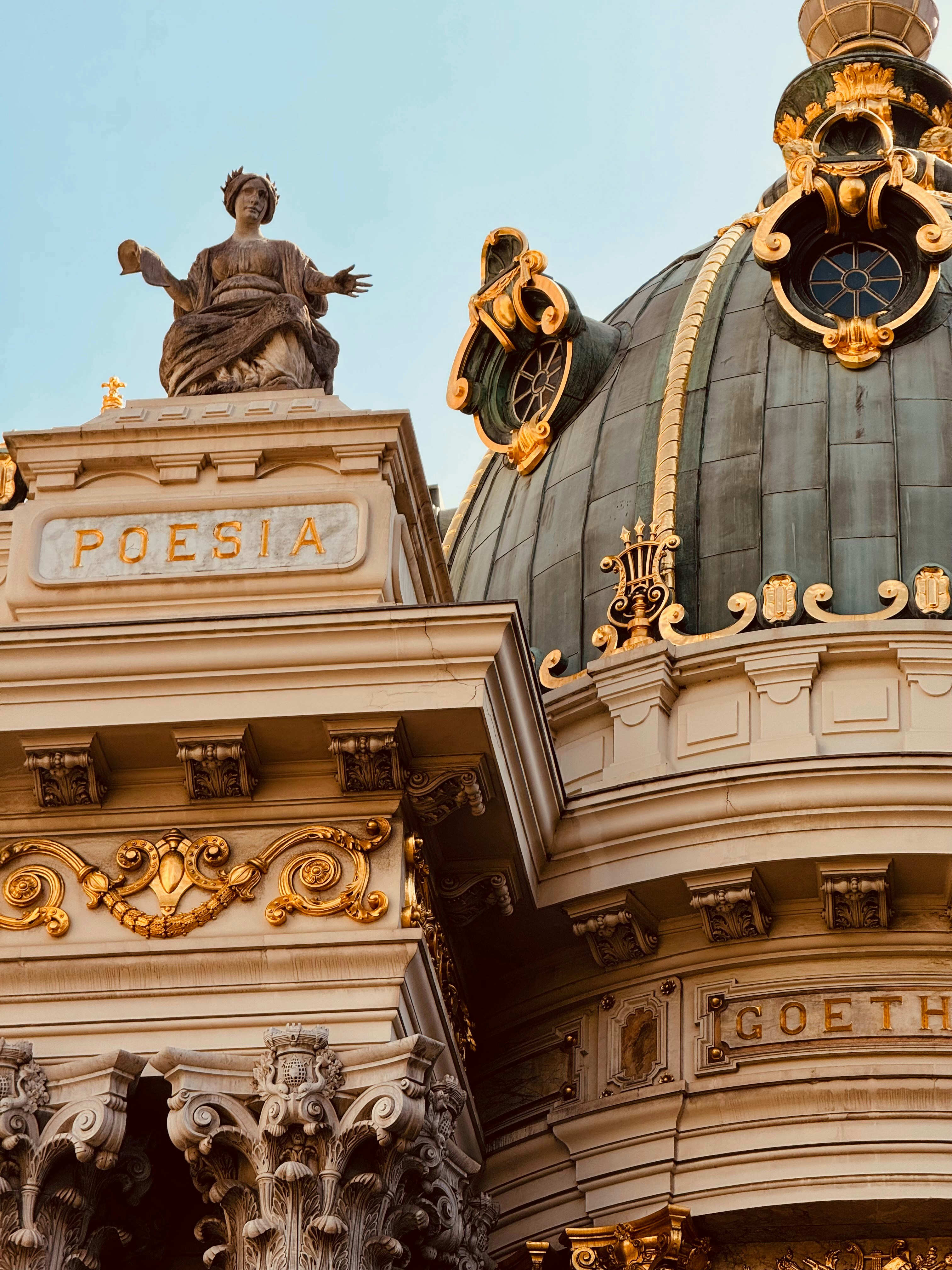 Poesia on the Dome: Sunlit Golds and Green Ornament on a Baroque Facade