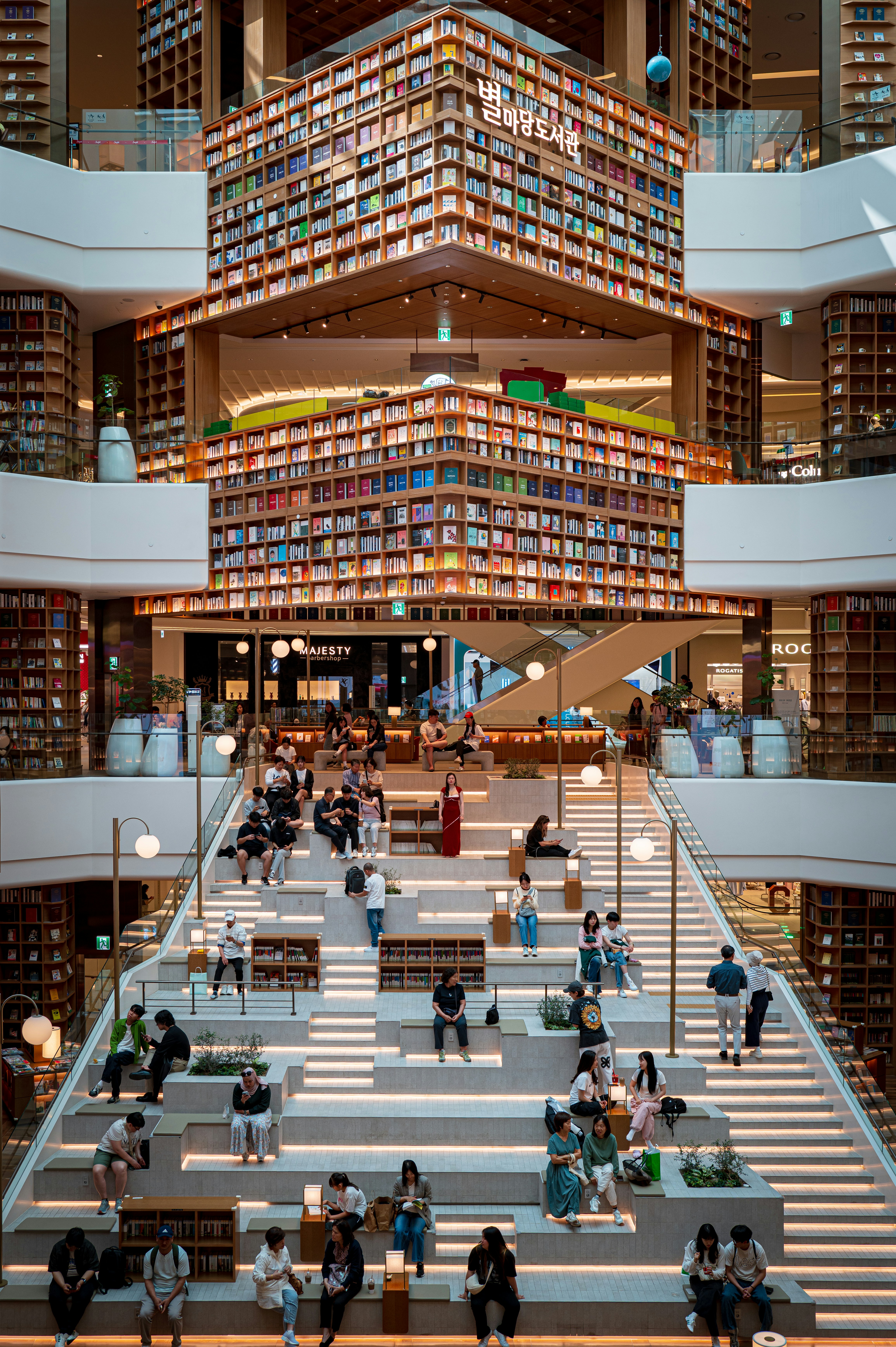 A large library filled with lots of books photo – Free Suseong-ro Image ...