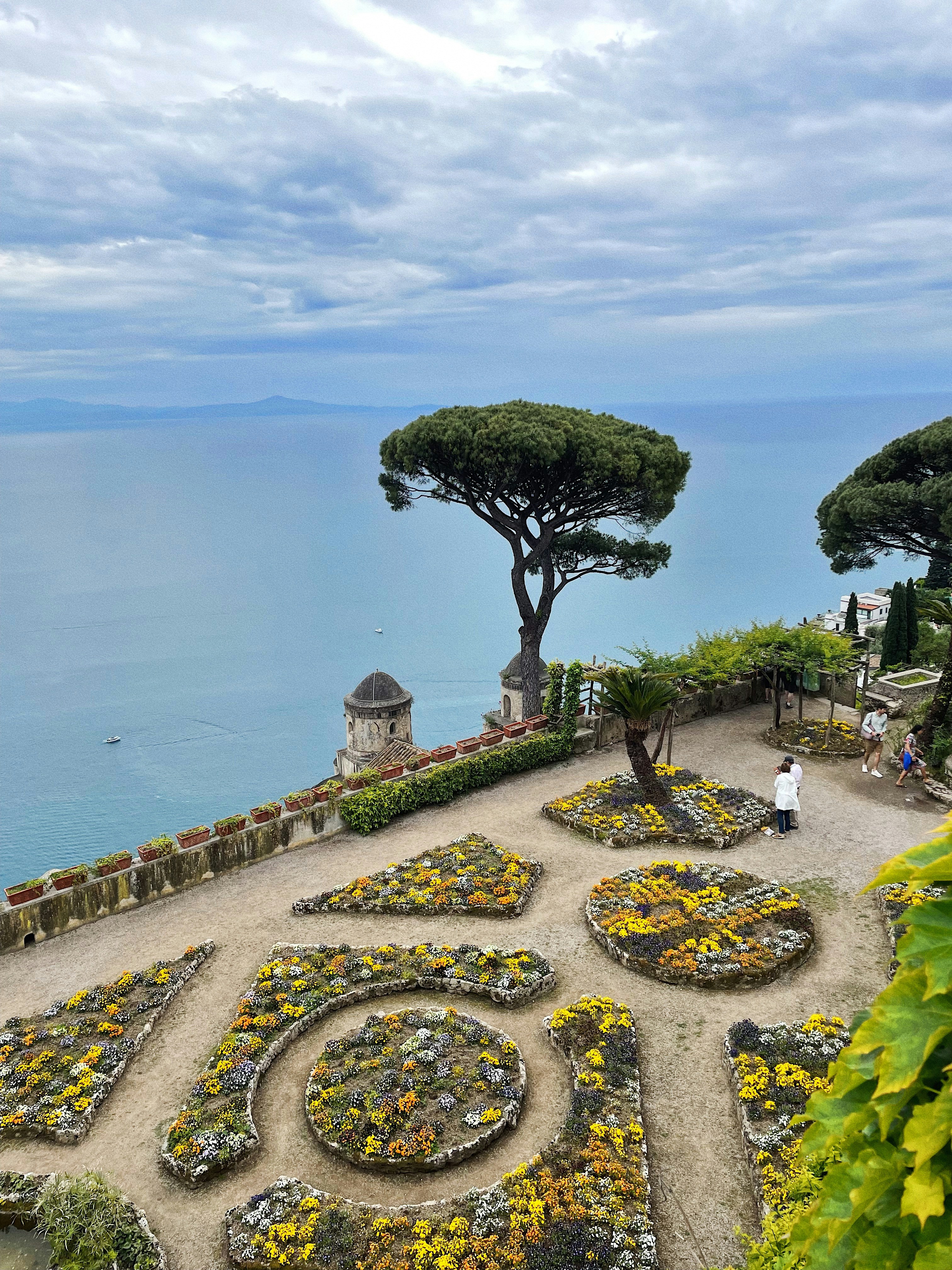 Clifftop Terrace in Bloom: Mediterranean Gardens Over the Sea