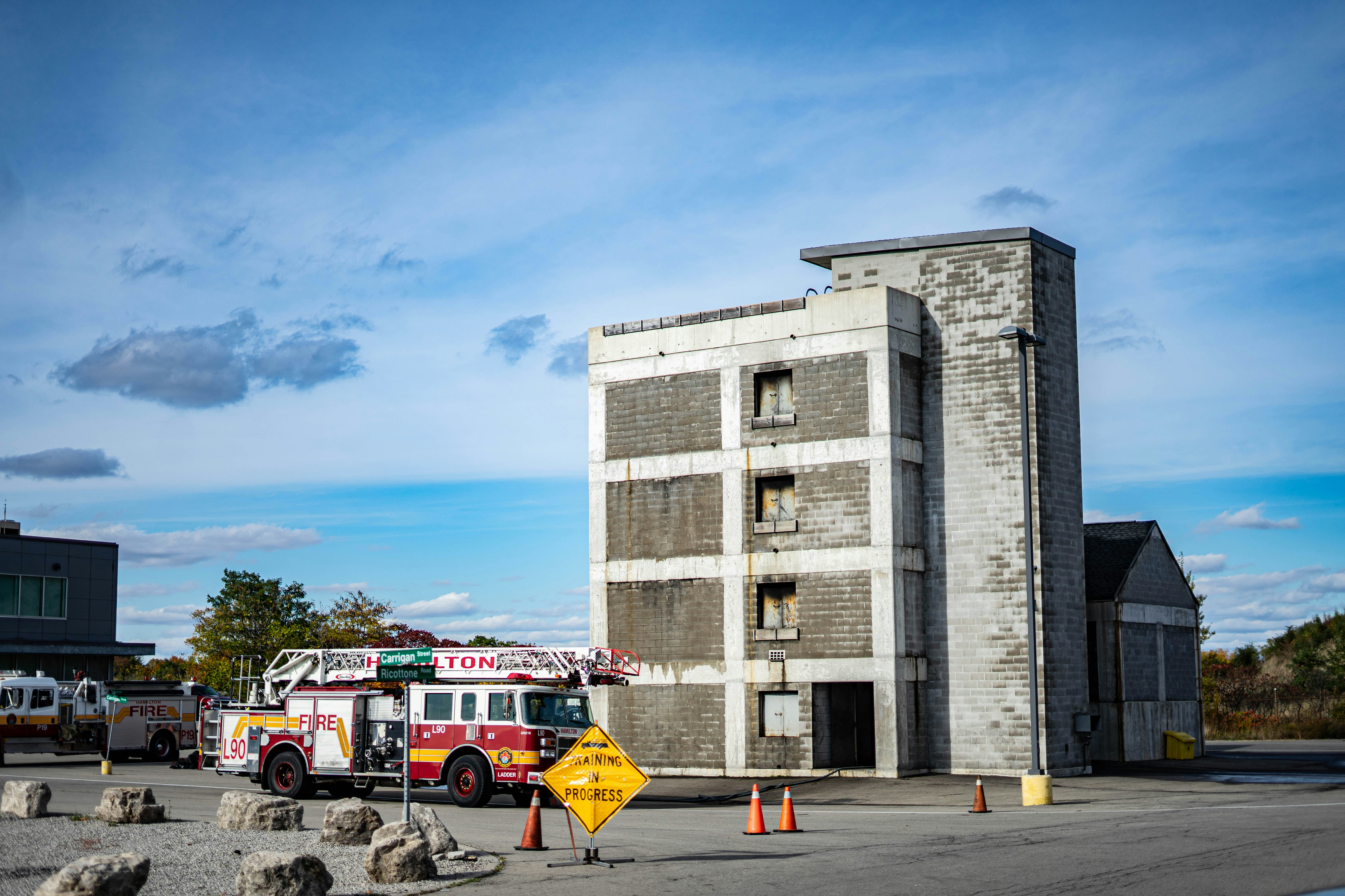 A fire truck parked in front of a building photo – Free City Image on ...
