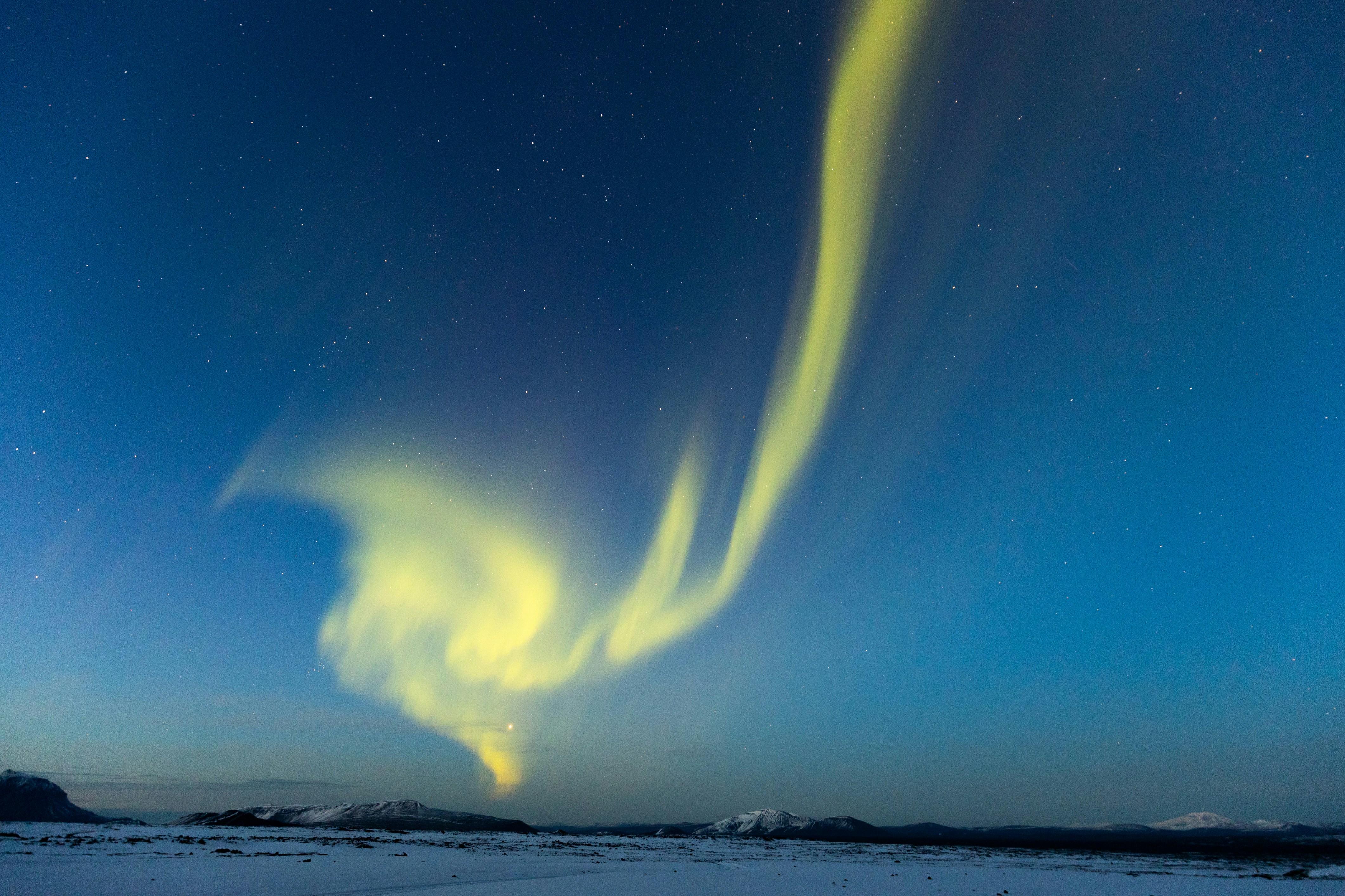 A bright green streak of light in the sky photo – Free Nature Image on ...