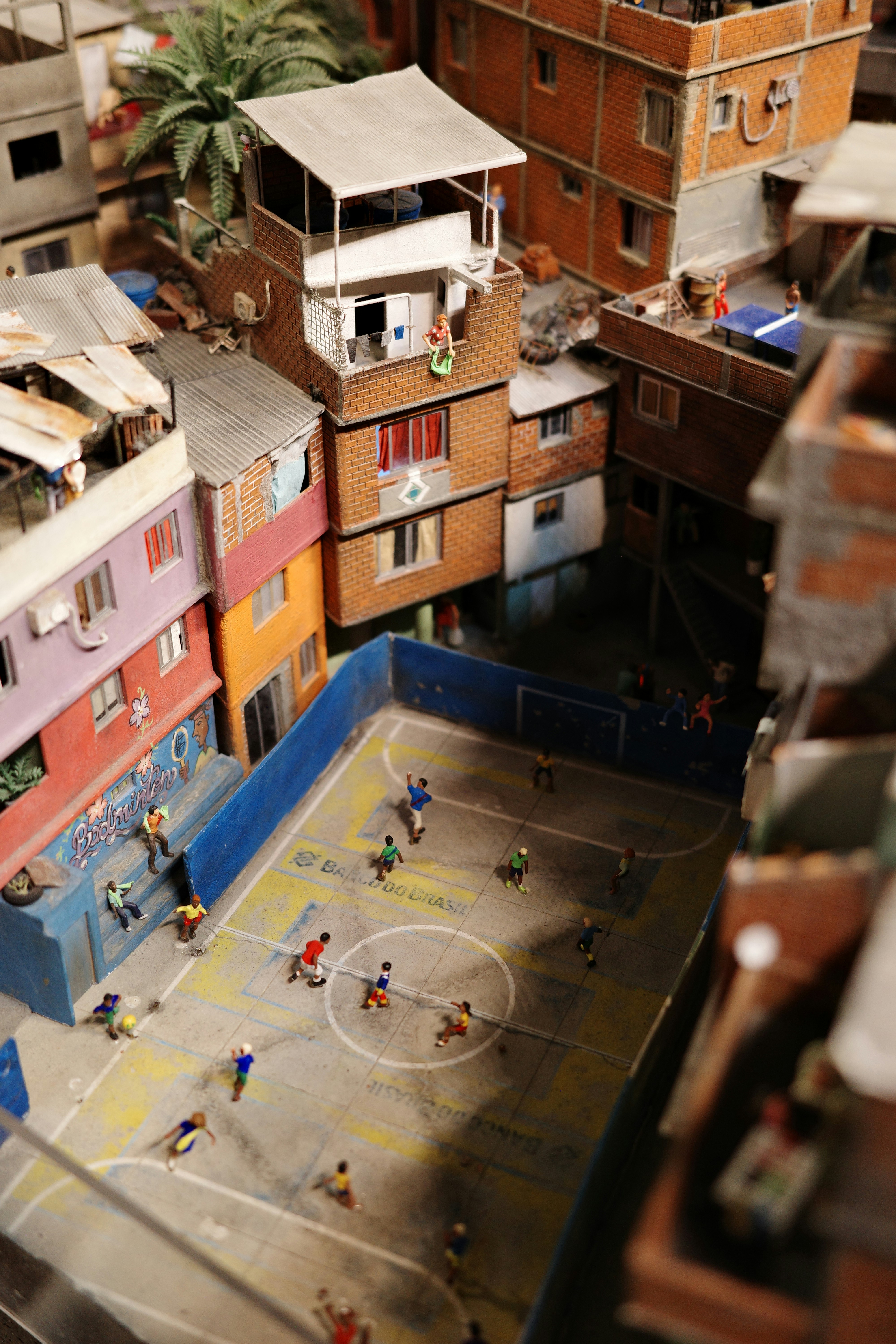 Rooftop Watcher Over a Tiny City Court