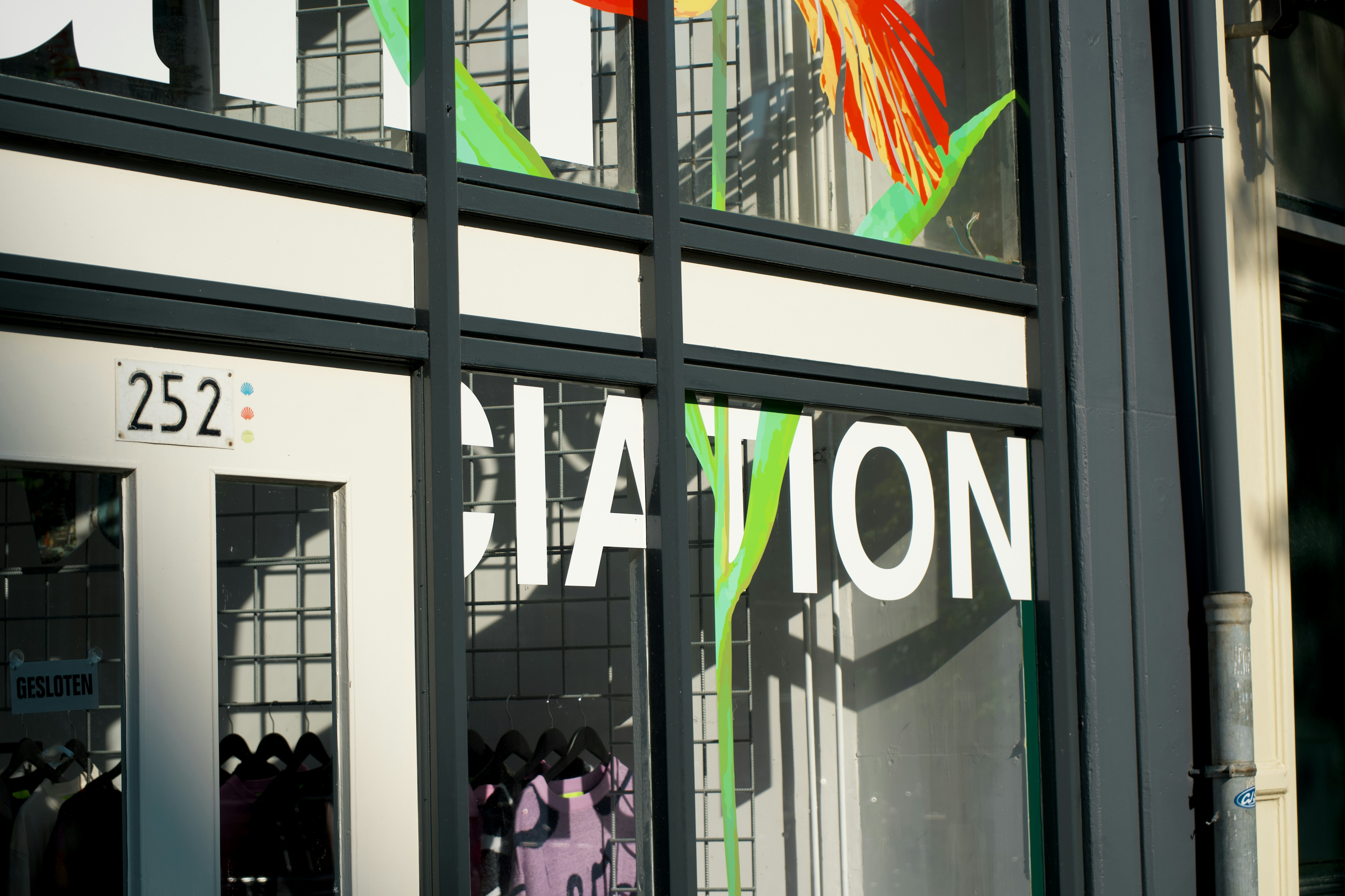 A storefront with a sign that says nation on it photo – Free Abstract ...