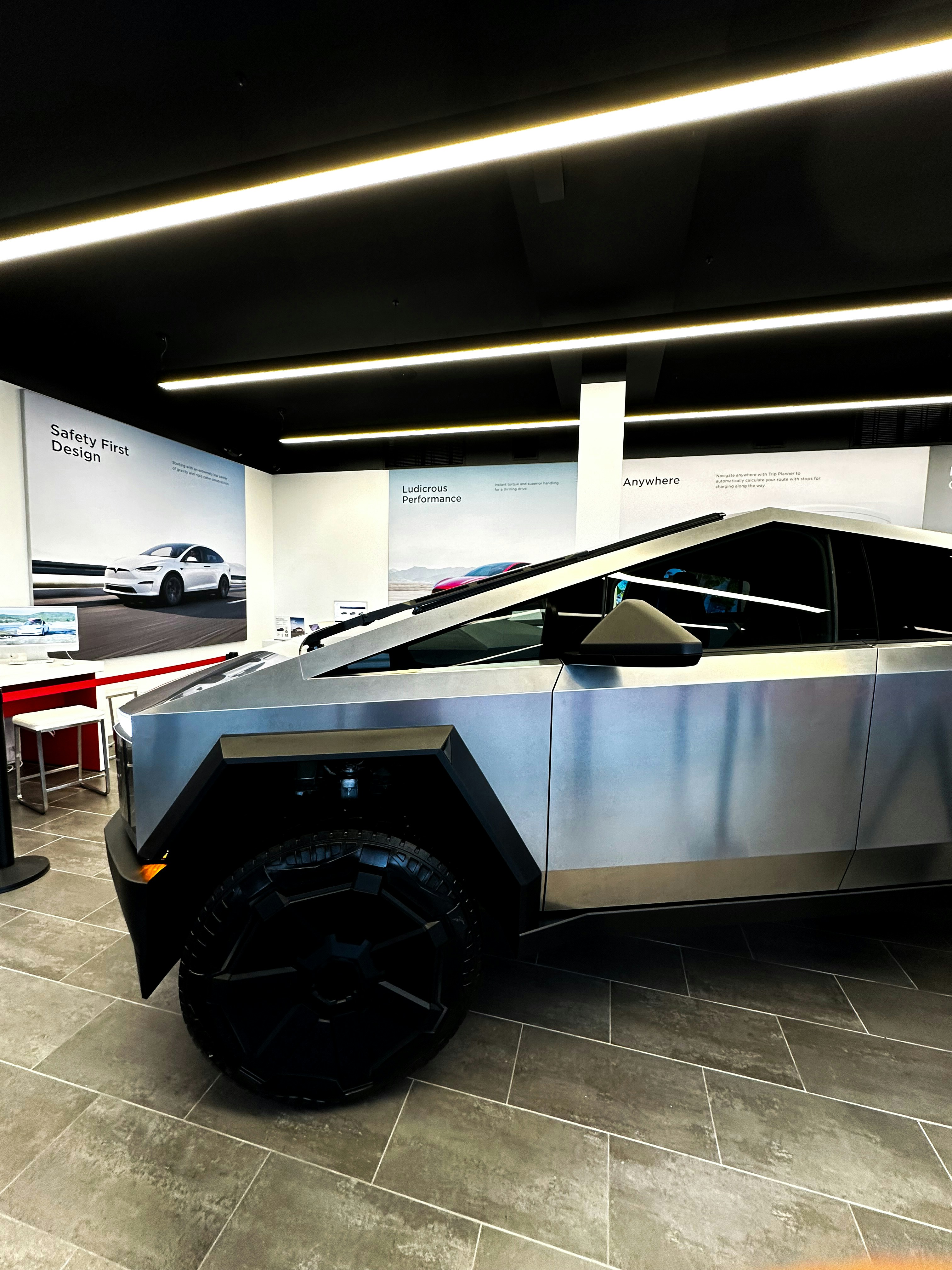 Gleaming Angular SUV on Display in Modern Car Gallery