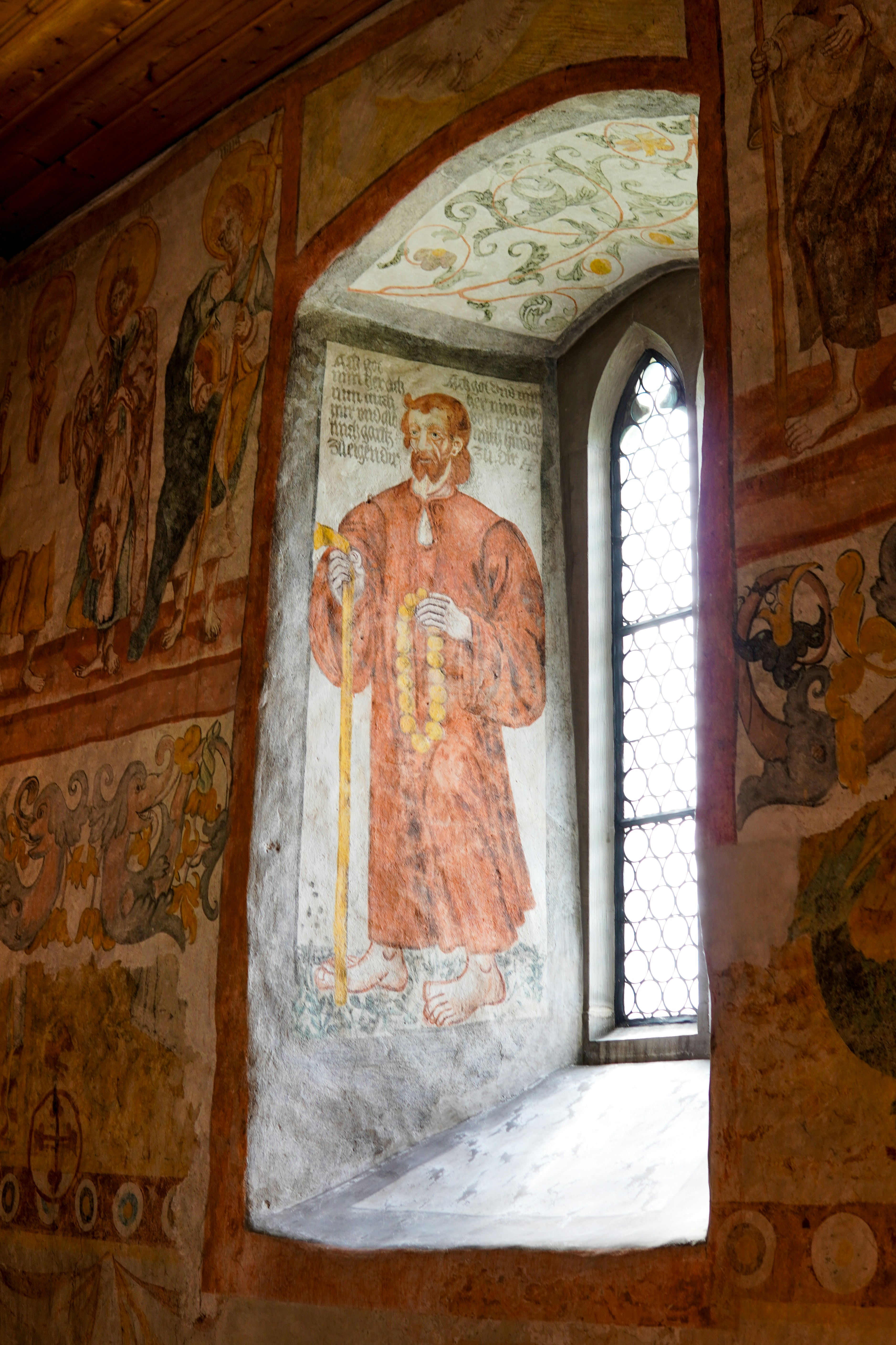 A painting of a priest on a wall photo – Free Woman Image on Unsplash