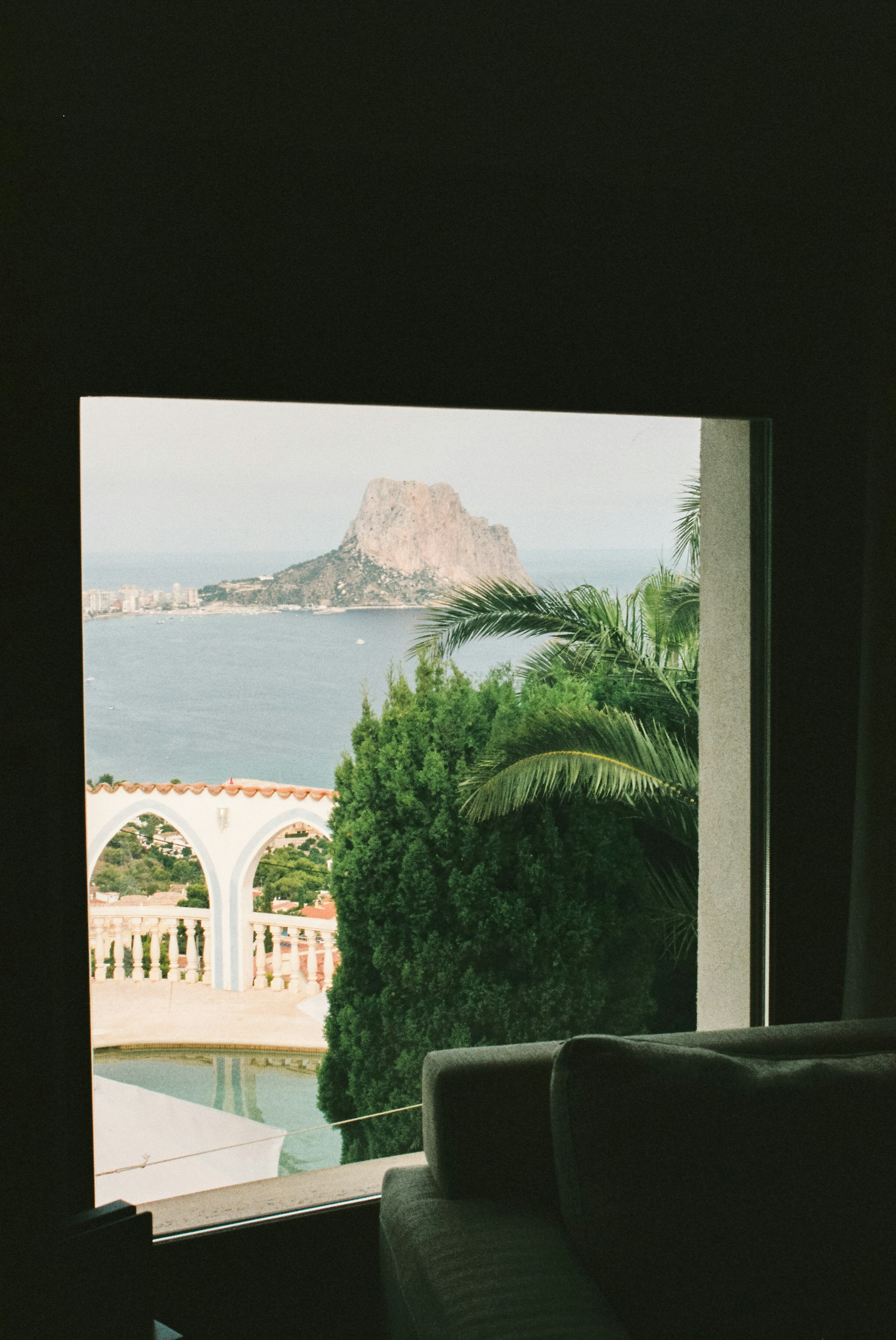 Island Crown Over a Palm-Fringed Terrace