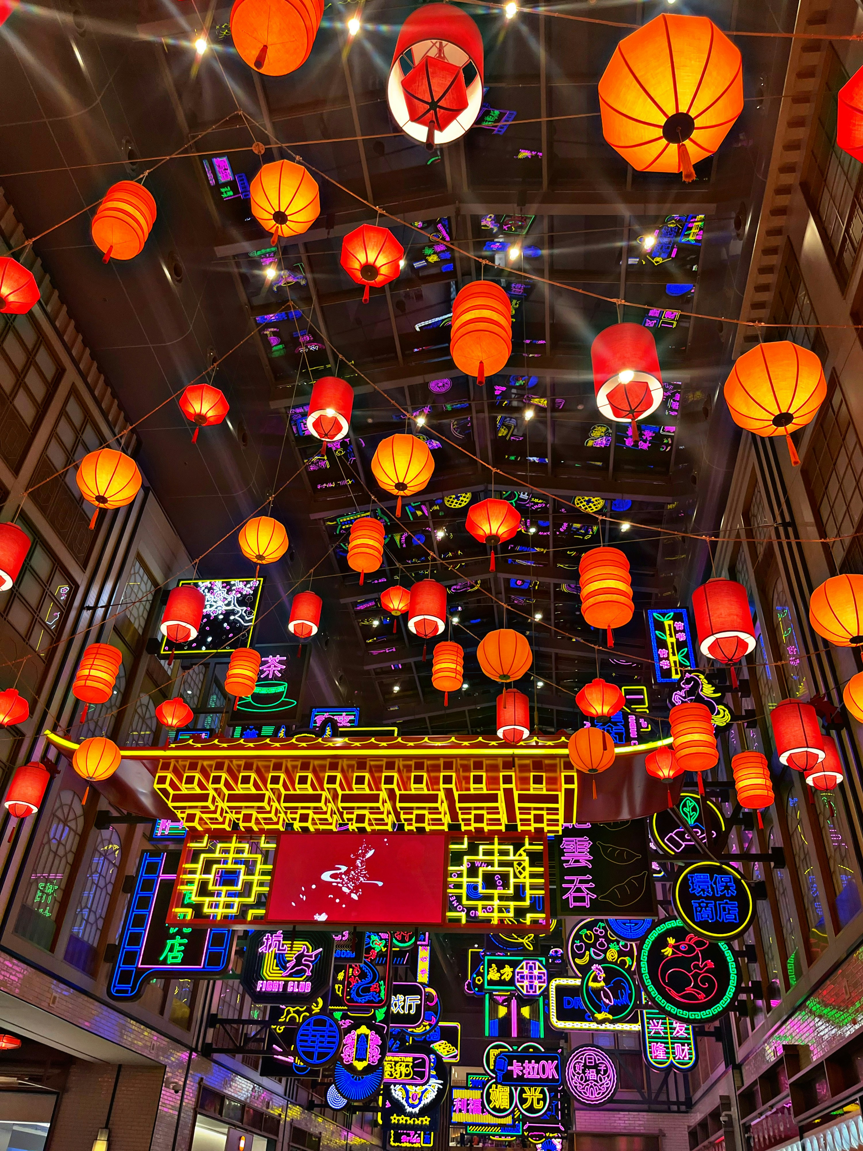 Lantern Choir Over Neon Atrium