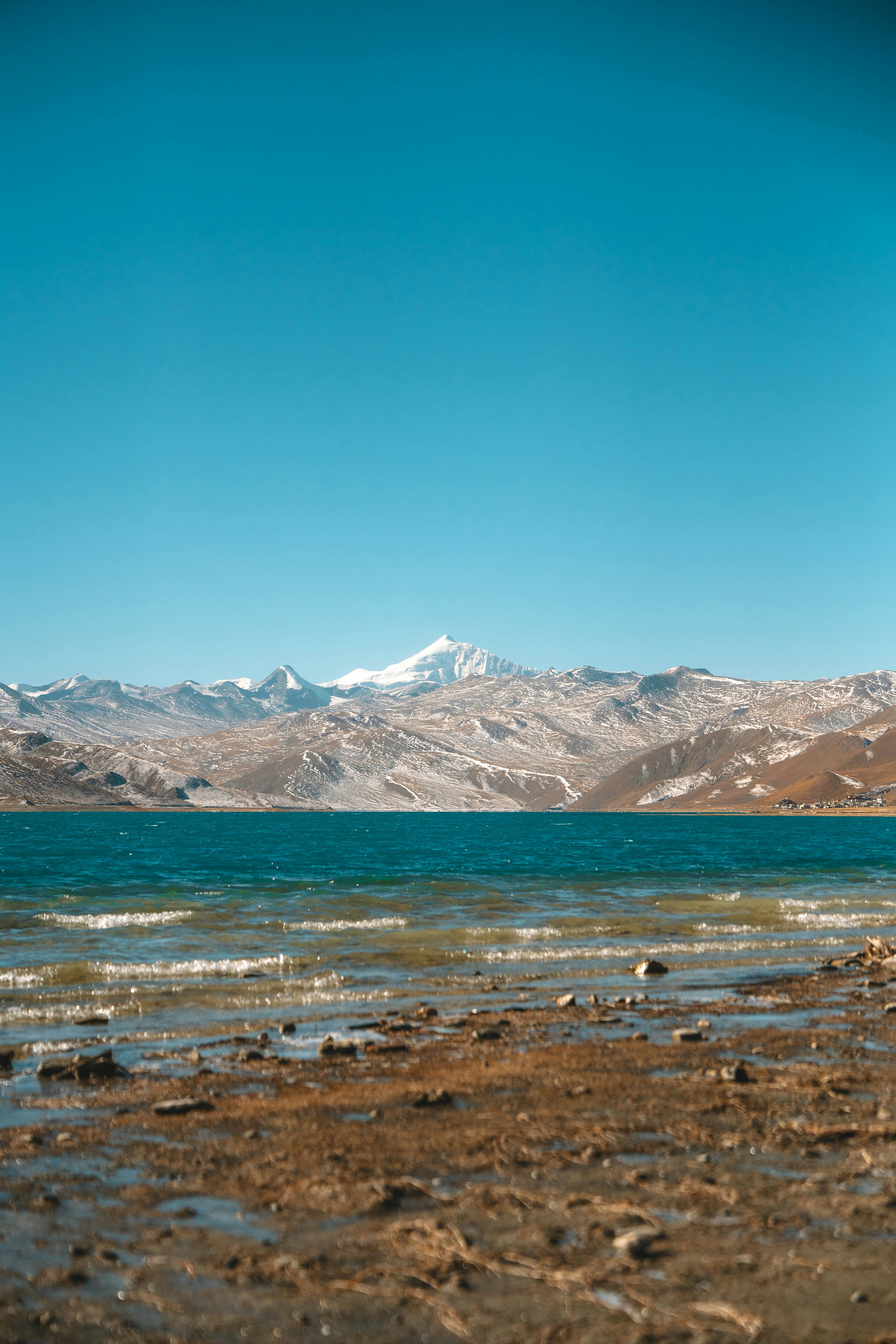 Snow-Capped Sentinel Over a Quiet Alpine Lake