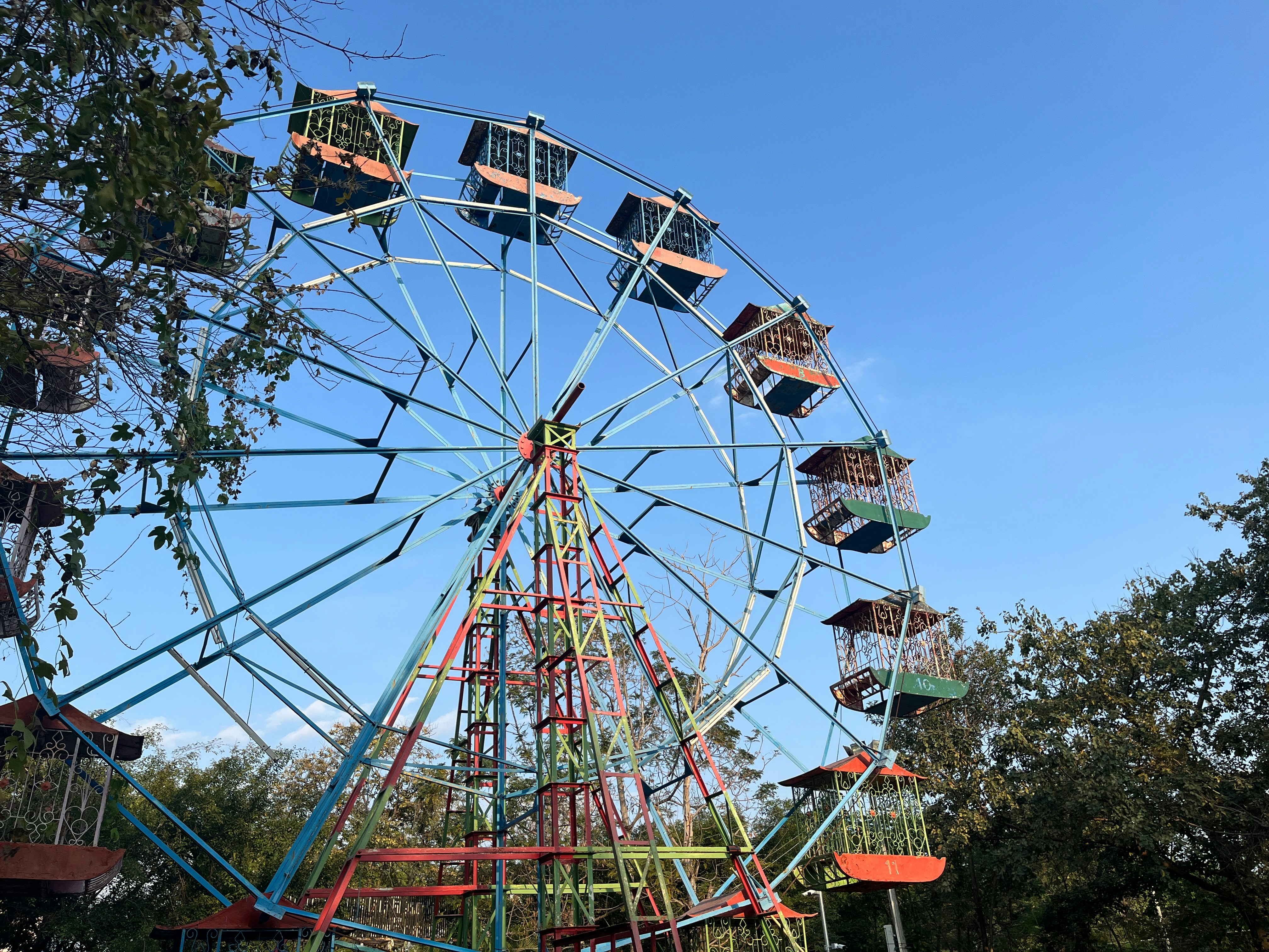 Colorful Ferris Wheel Under a Pristine Blue Sky