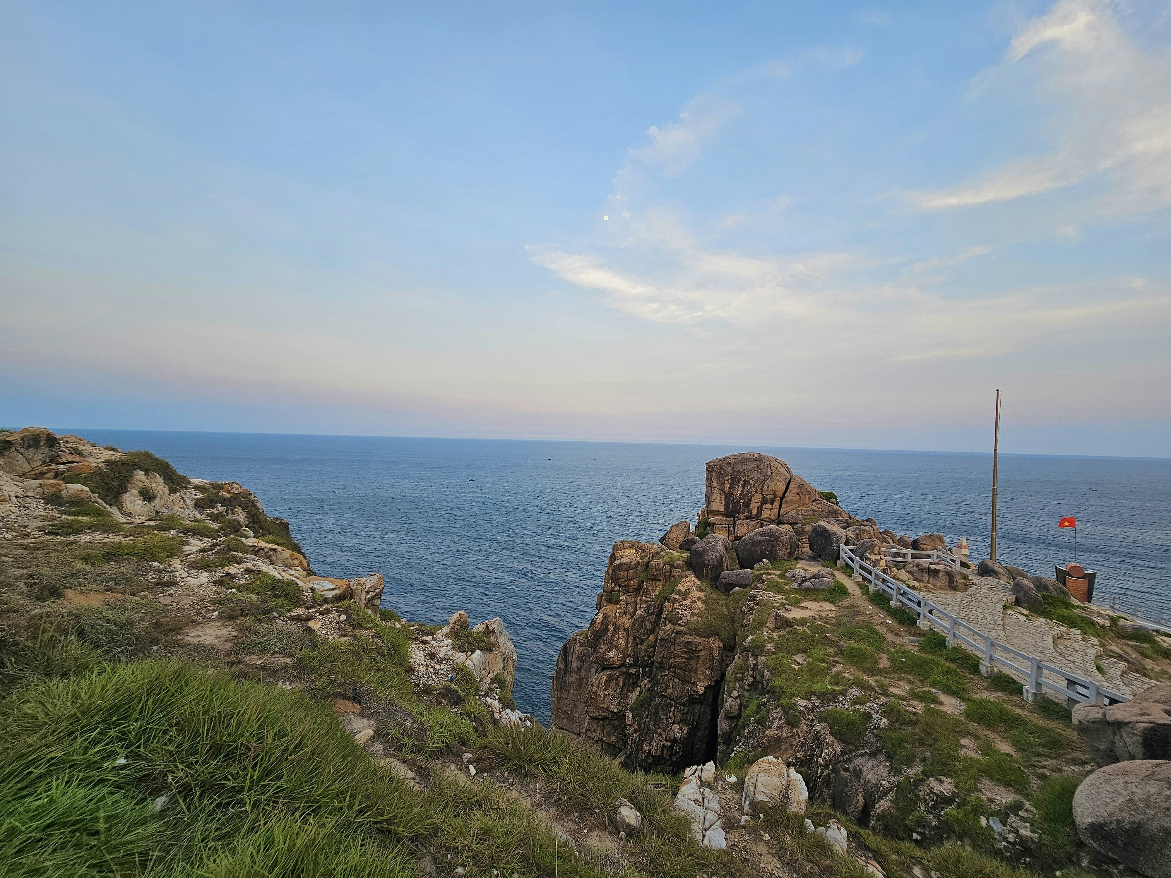 Promontory Path to the Atlantic: Rugged Rocks, Quiet Sea