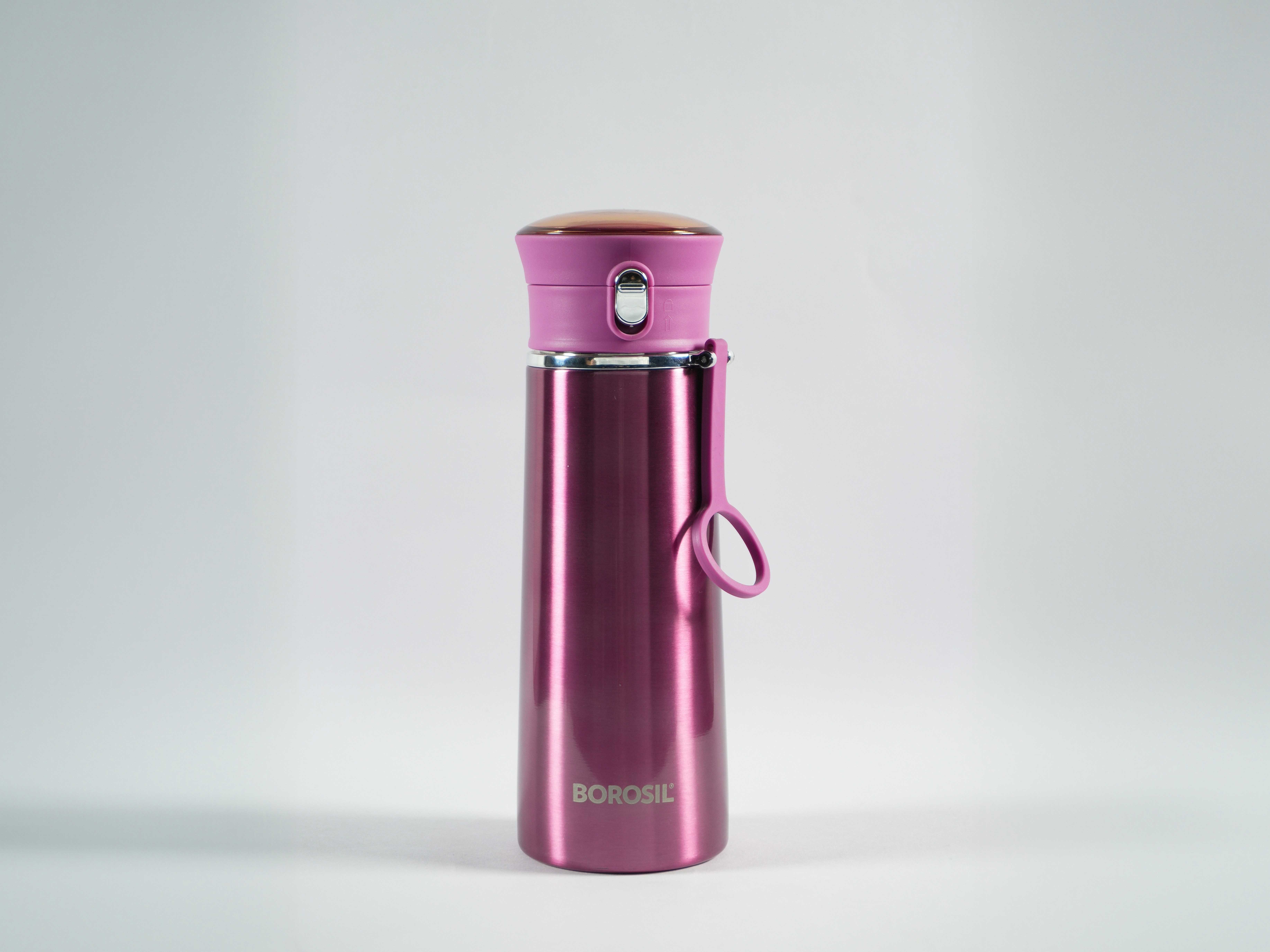 A pink thermos bottle sitting on a white surface photo – Free Bottle ...