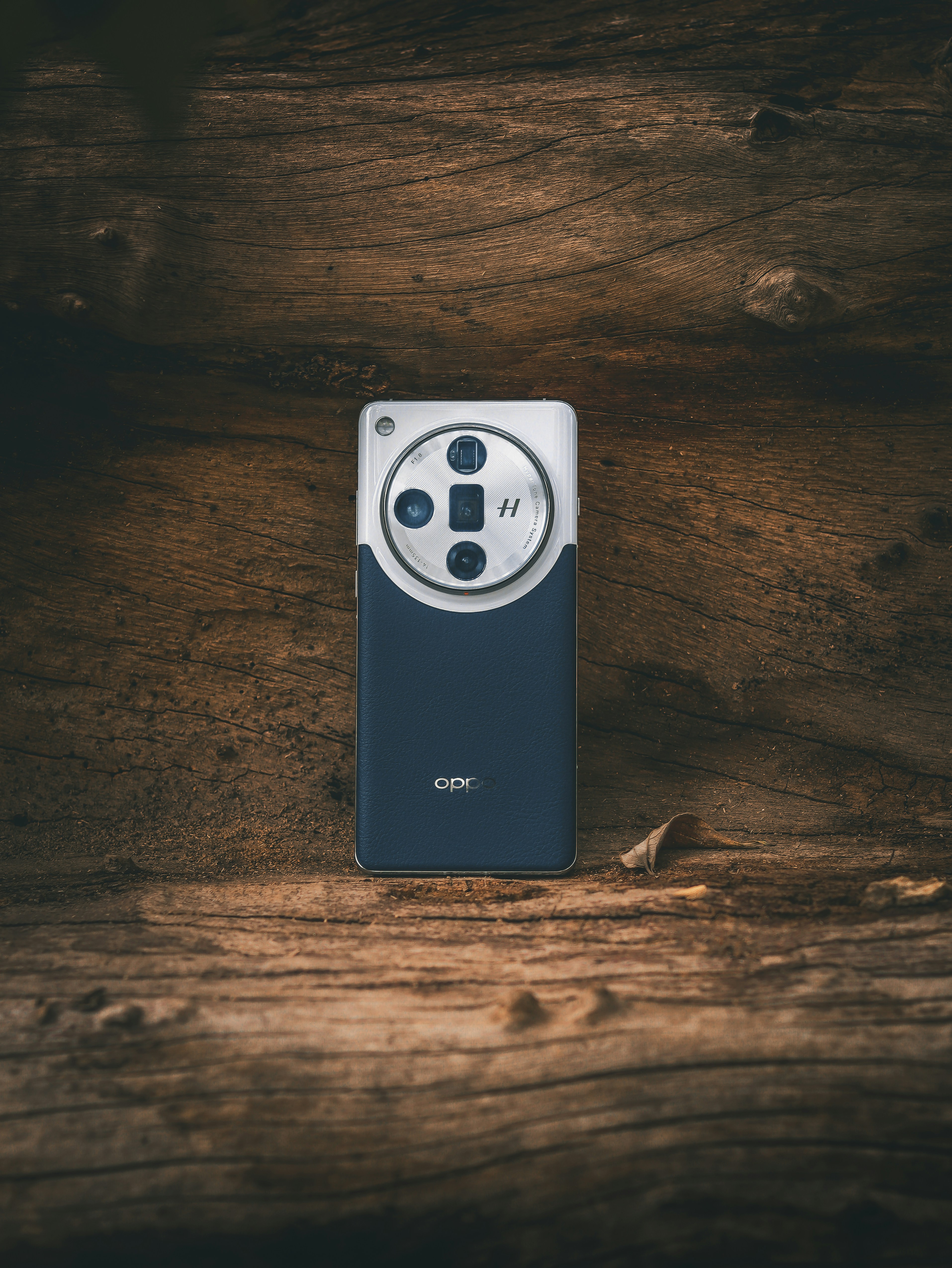 a remote control sitting on top of a wooden table