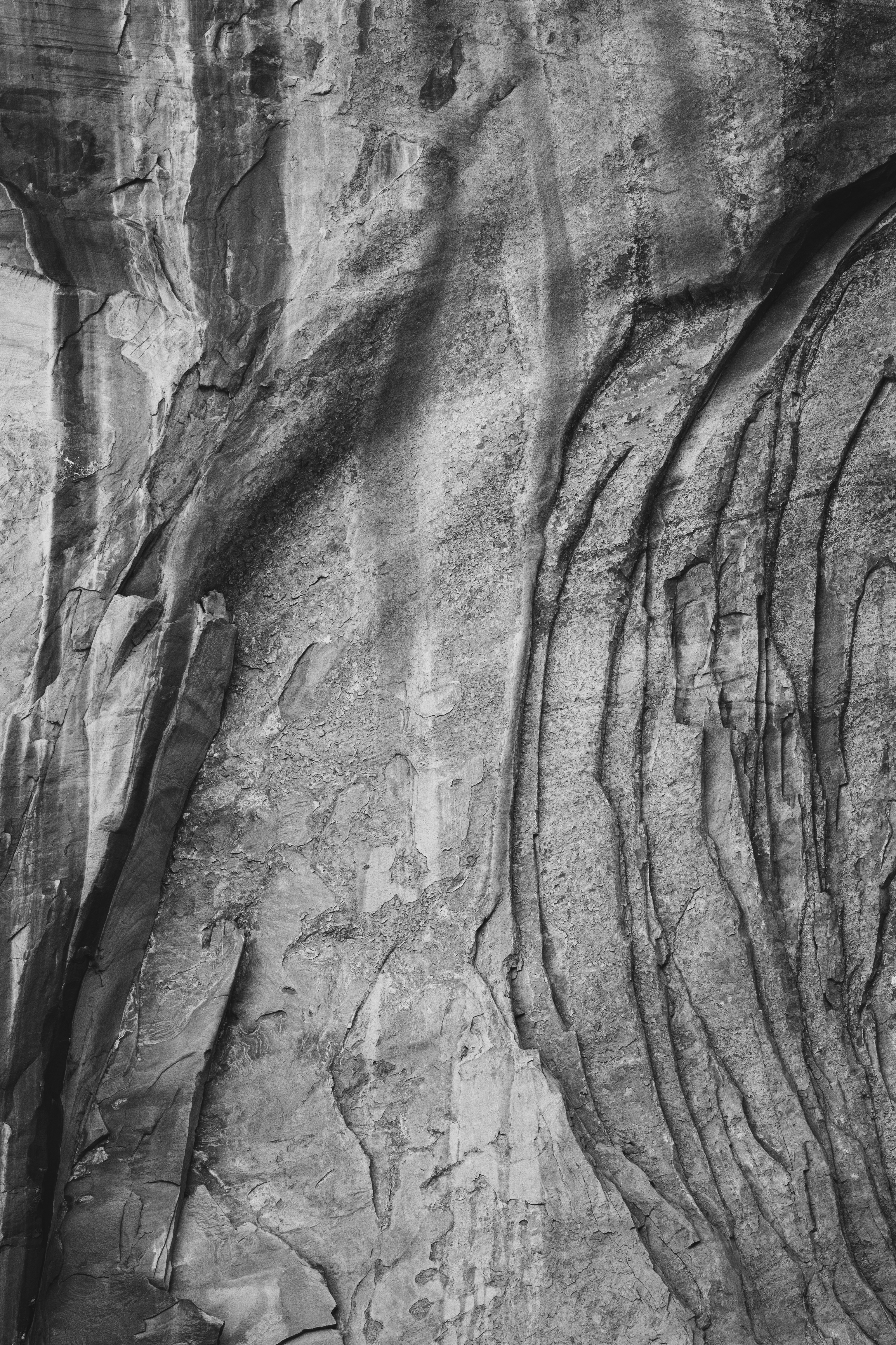 A black and white photo of a rock face photo – Free Grey Image on Unsplash