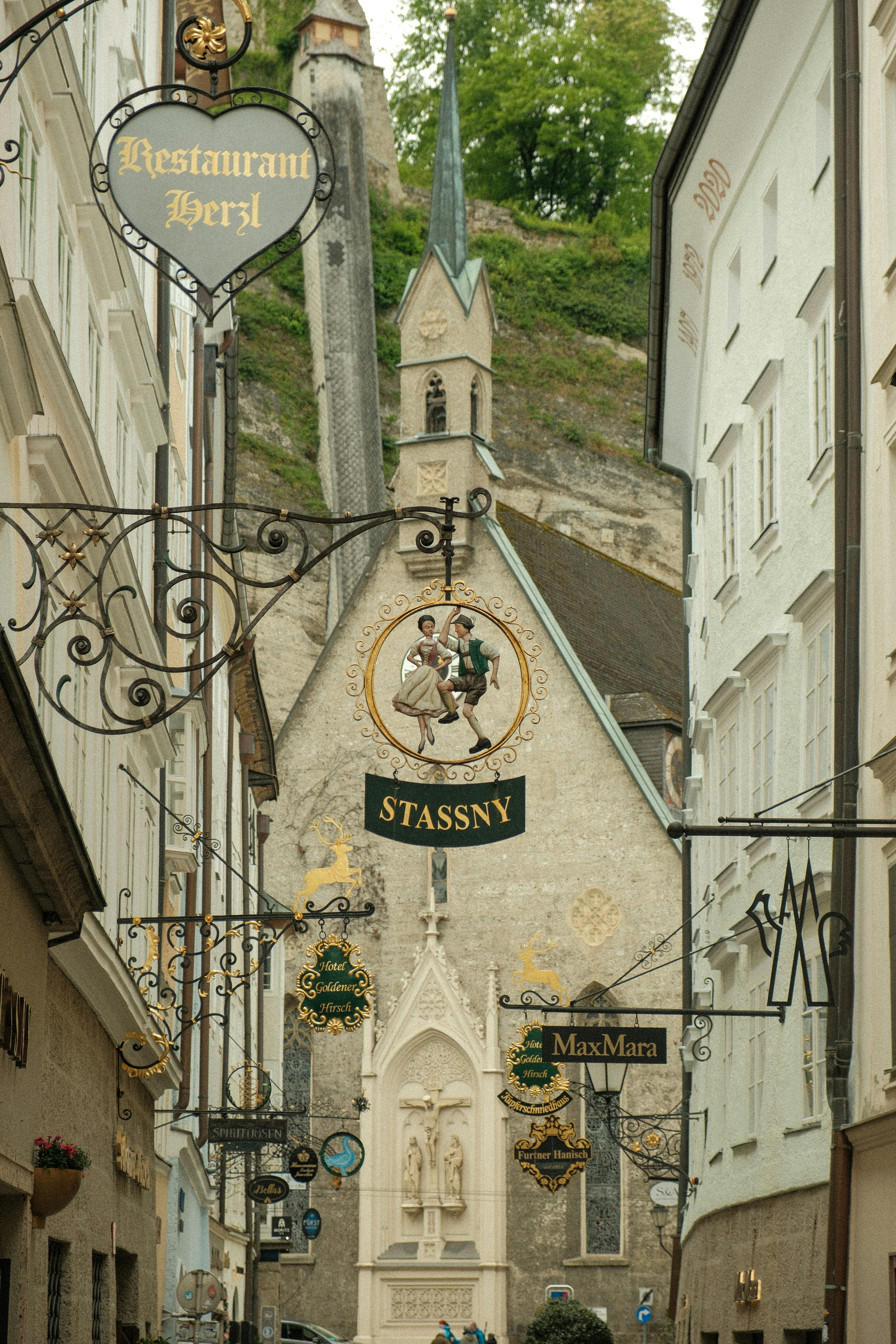 Gothic Signage Corridor: A Narrow Street to the Stassny Chapel