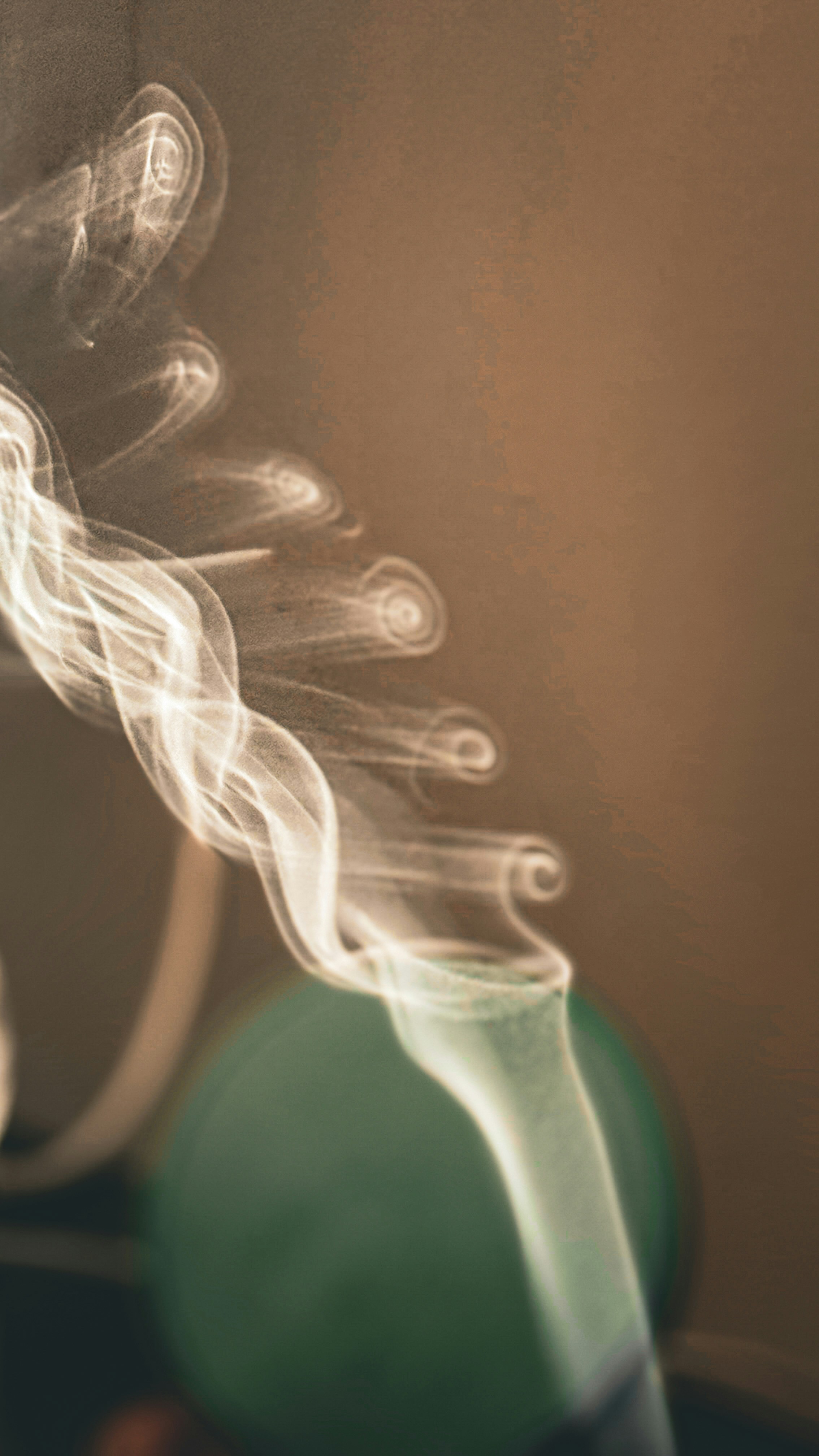 Spirals Over a Green Vessel in Quiet Warm Light