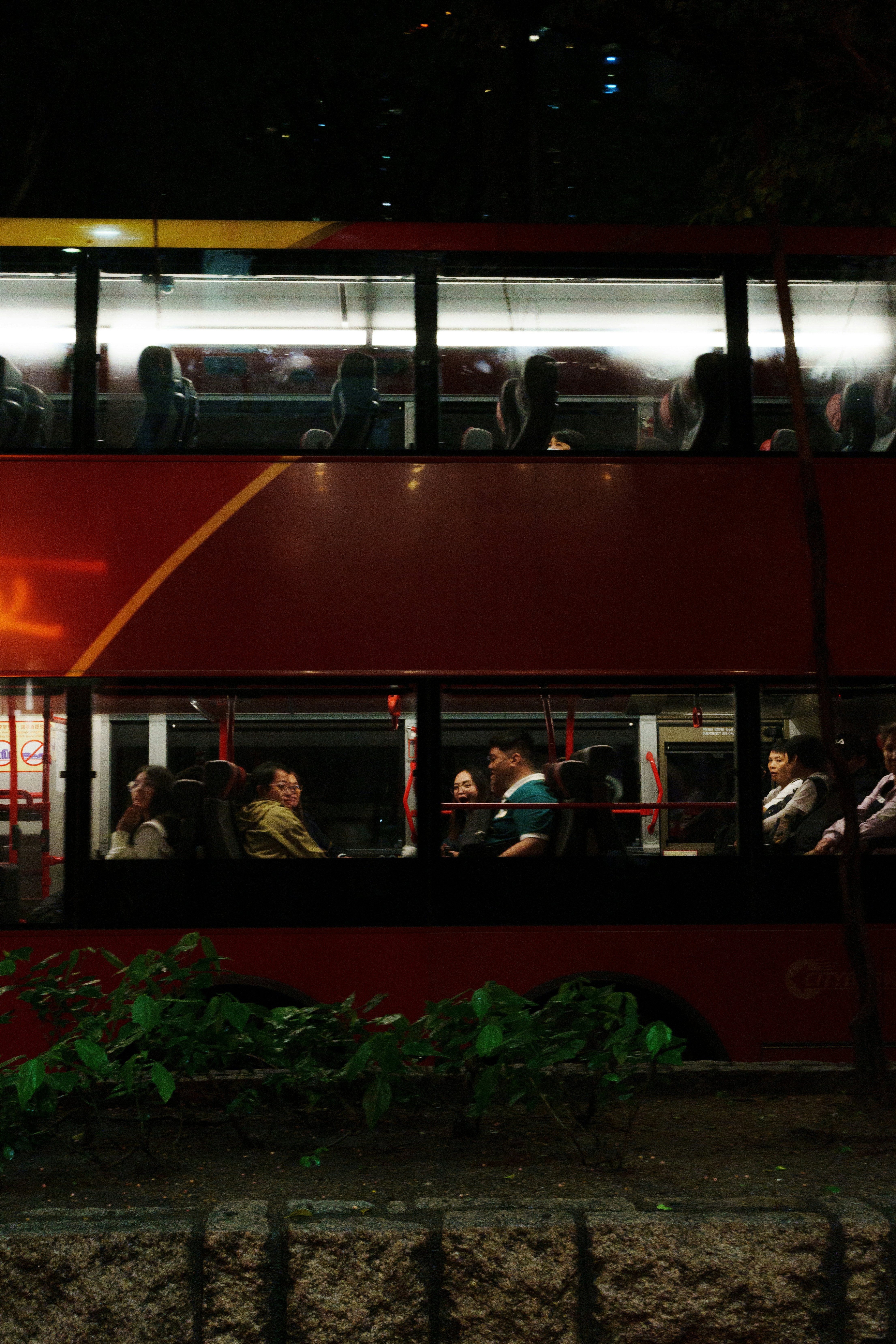 A red double decker bus filled with people photo – Free Bus Image on ...