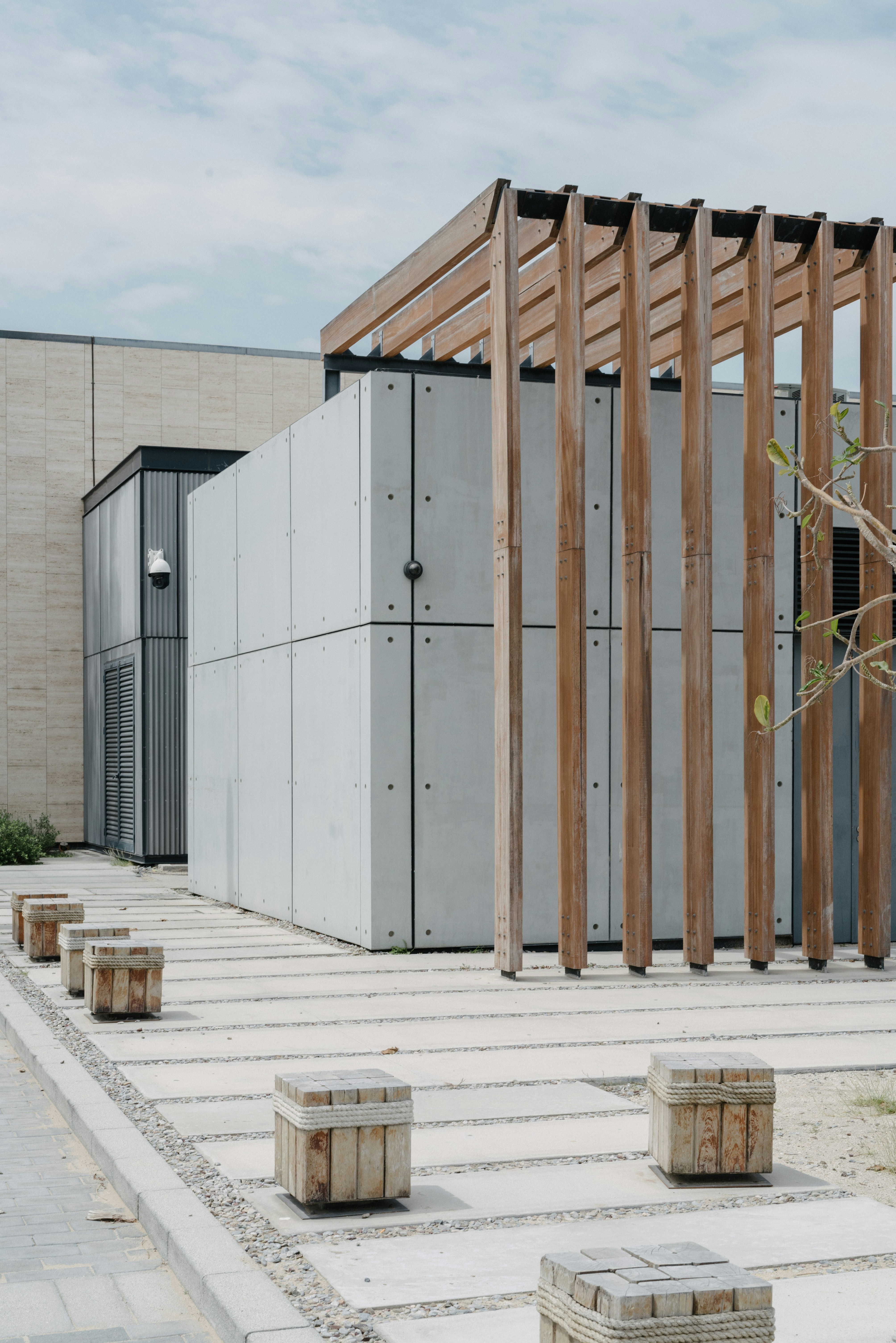 A building that has a bunch of benches in front of it photo – Free La ...