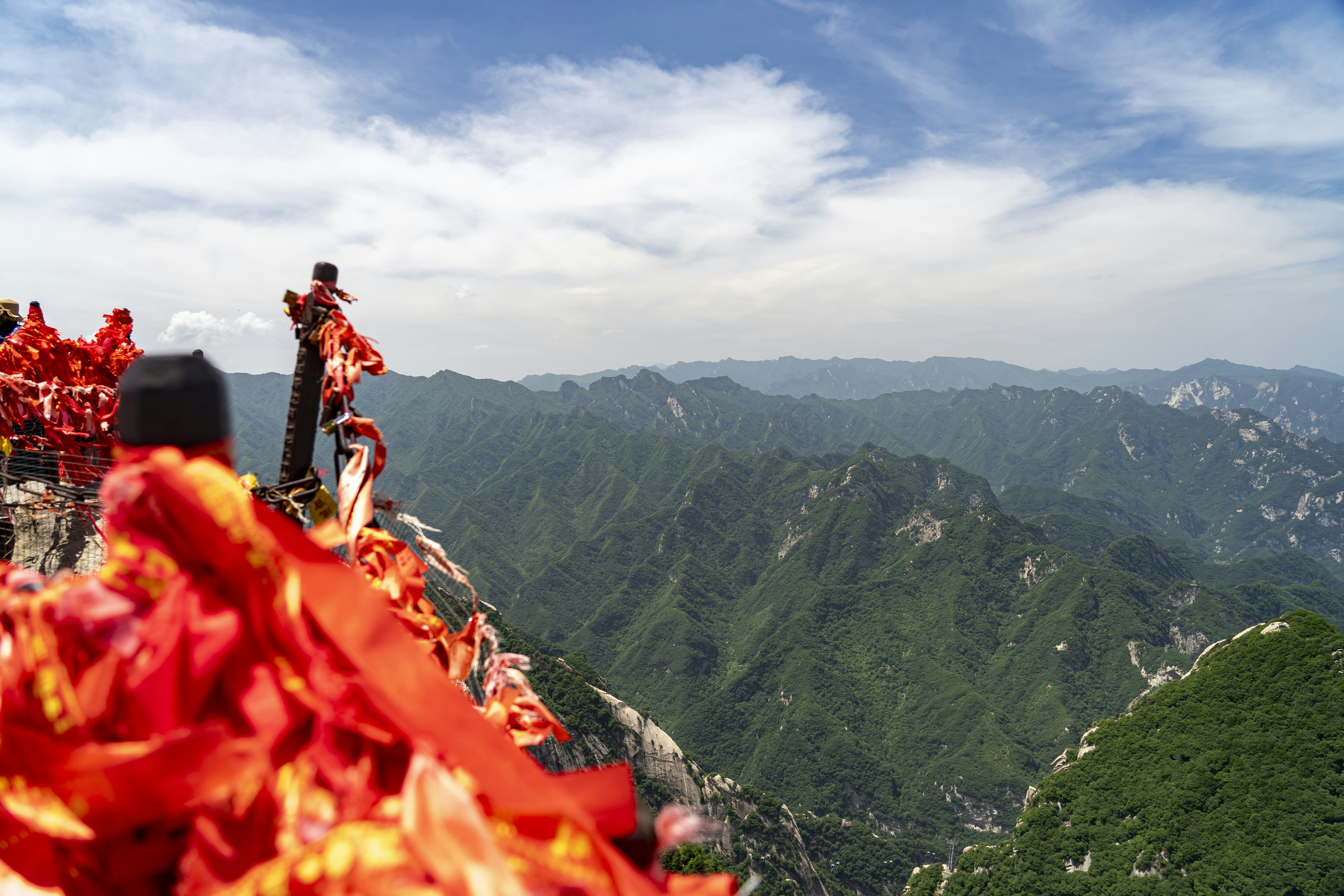 Vibrant Ribbons Overlook Serene Mountain Vistas