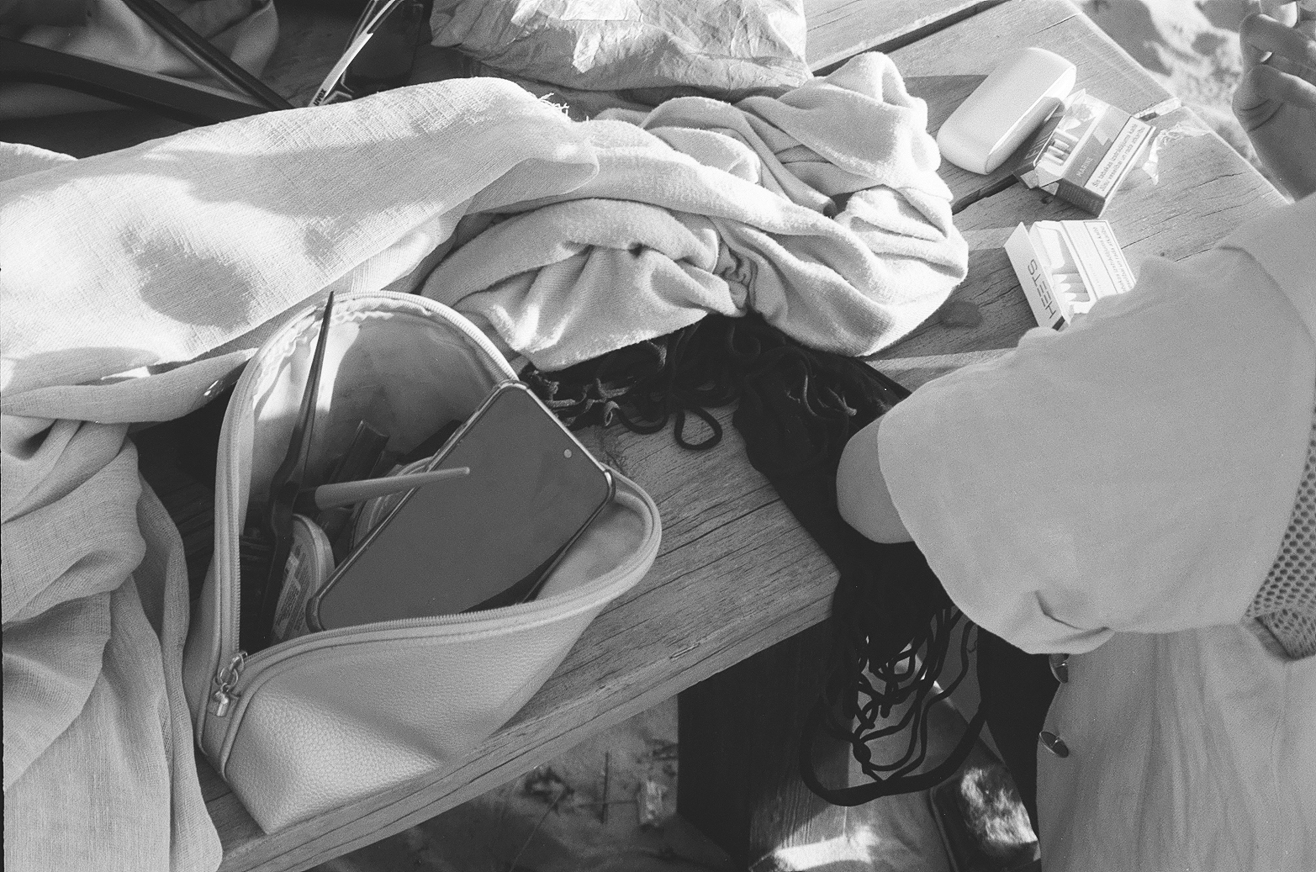 Tangled Treasures in a Tote: A Phone Among Cloth and Cables