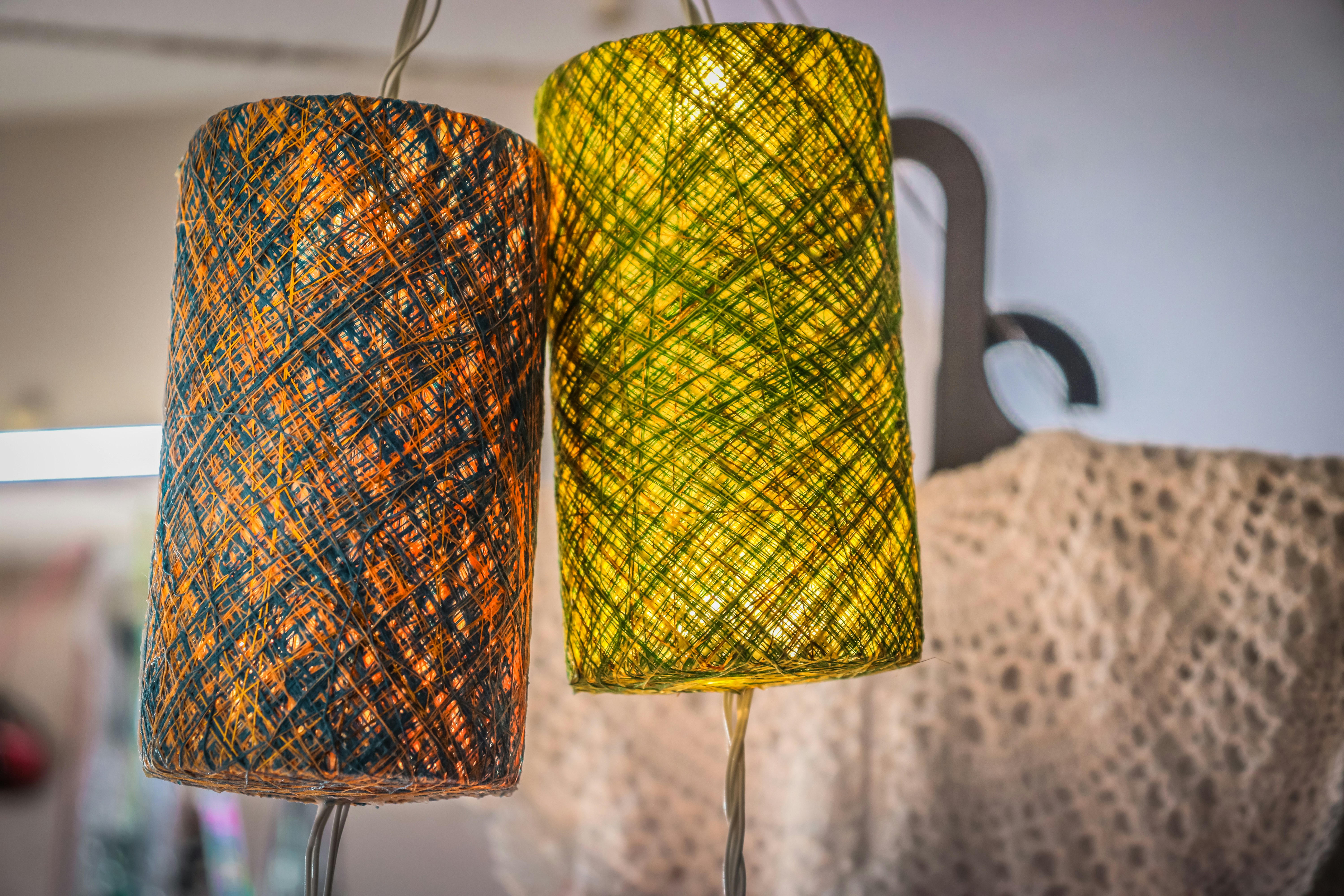 Woven Glow: A Pair of Textured Lamps in Soft Focus