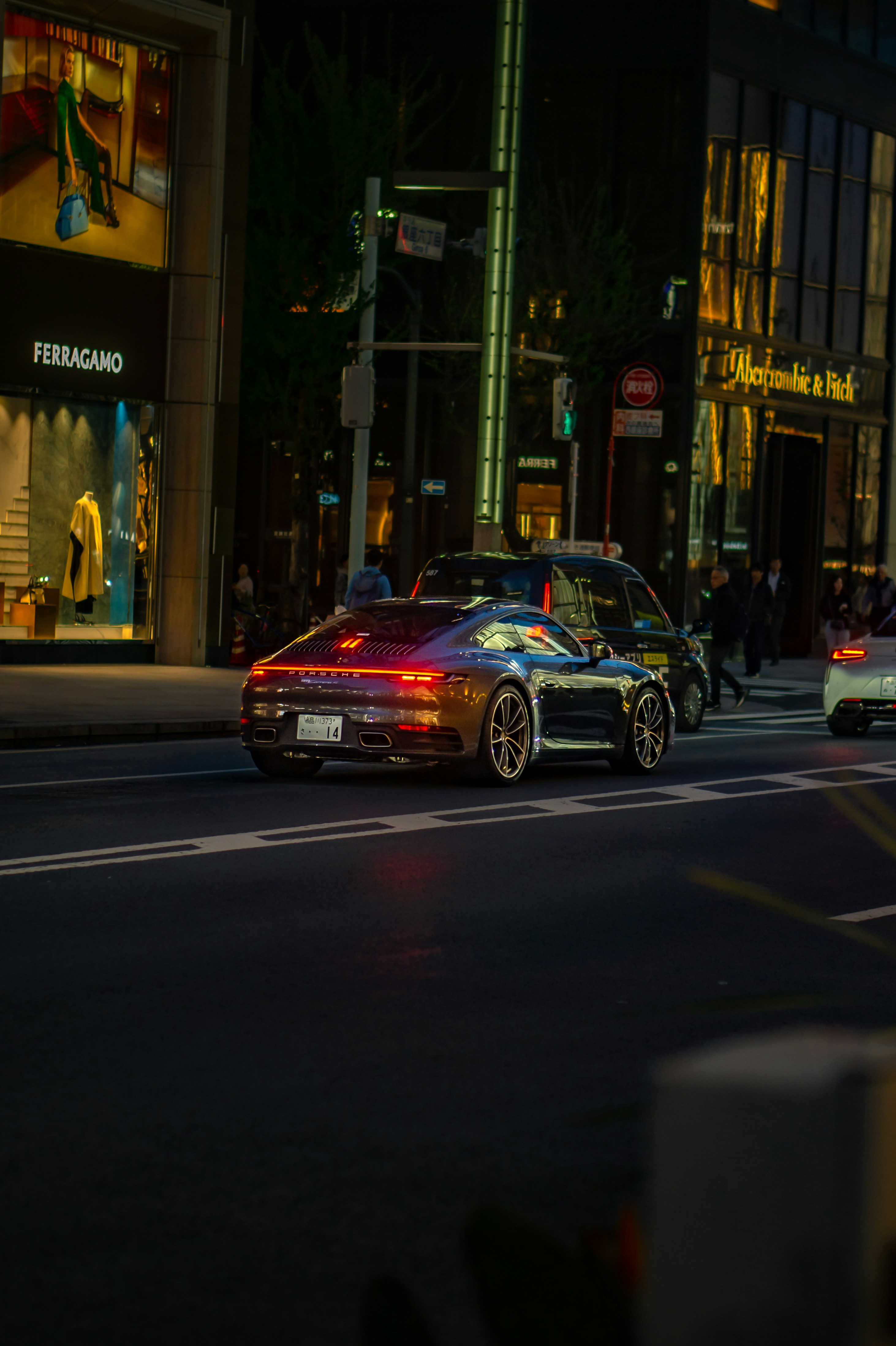 Midnight Velocity: A Porsche Anchors Neon Downtown
