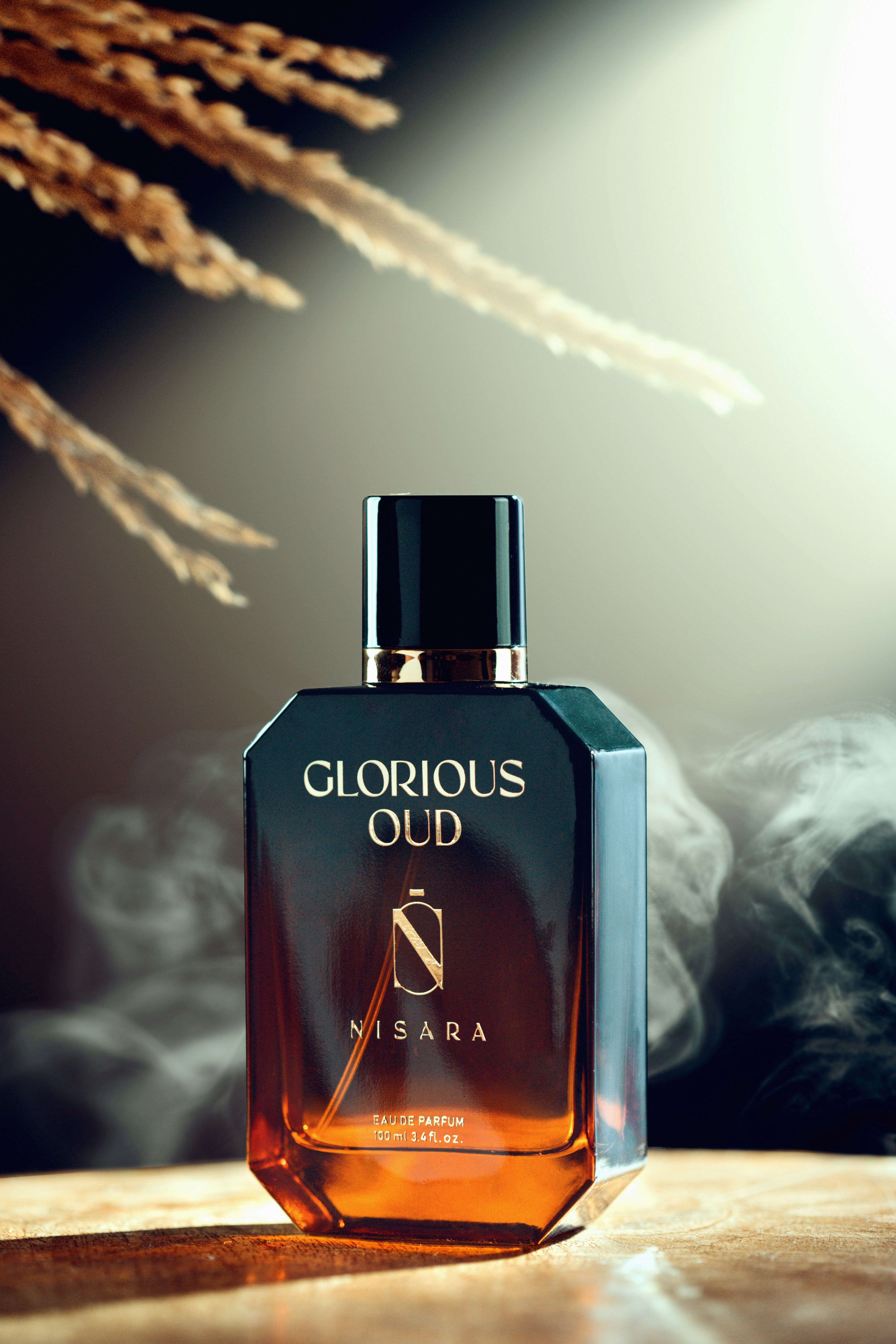 A close up of a bottle of perfume on a table photo – Free Grey Image on ...
