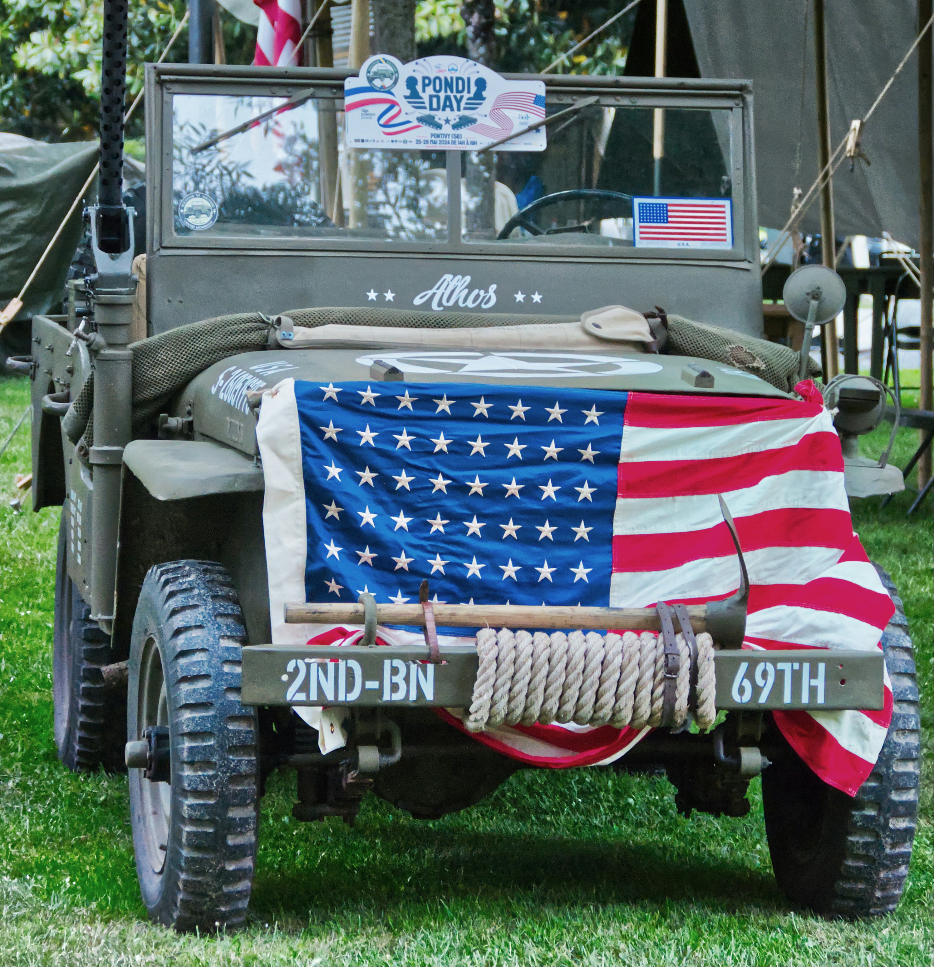 An old military jeep with an american flag on it photo – Free Memorial ...