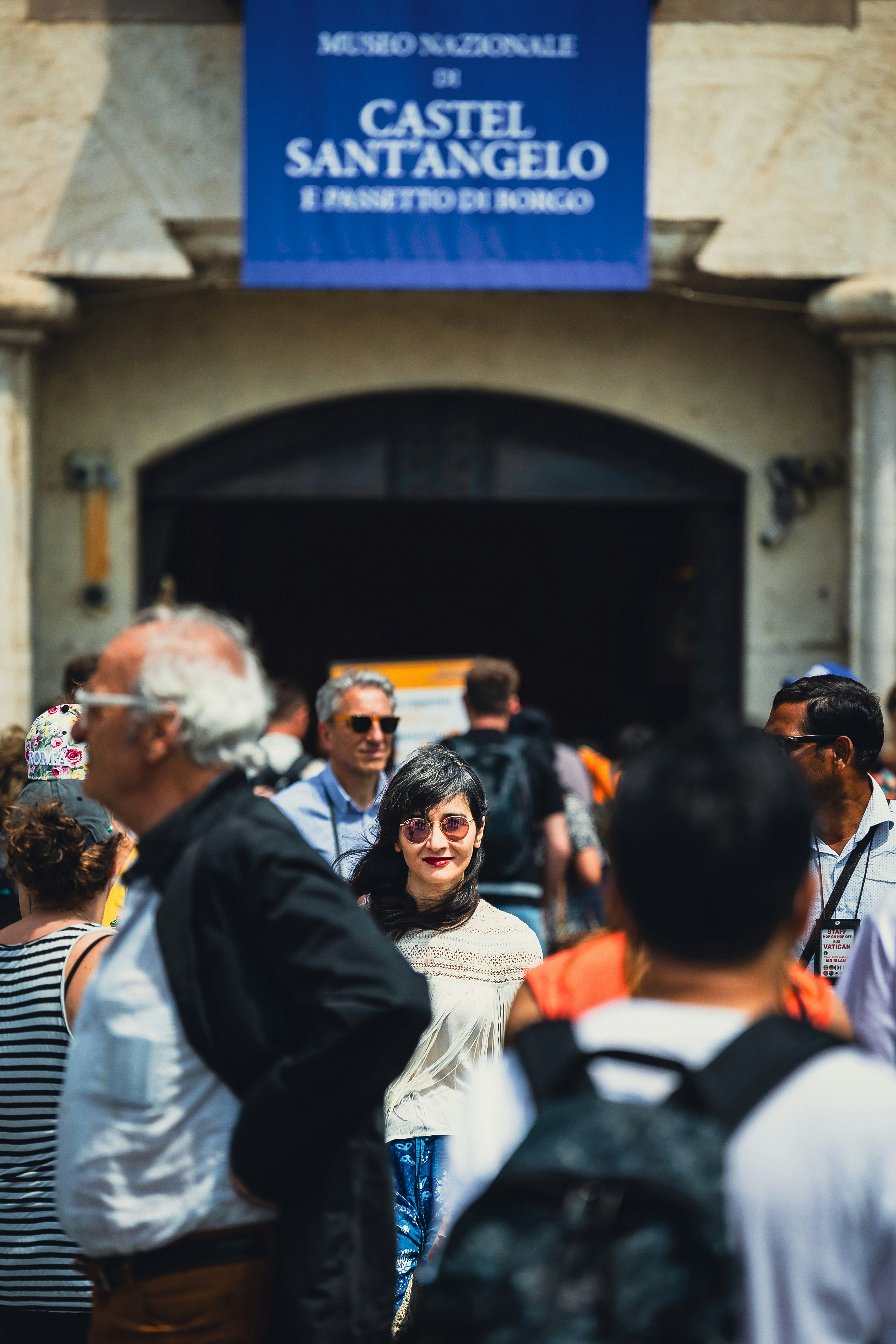 A group of people standing in front of a building photo – Free Castel ...