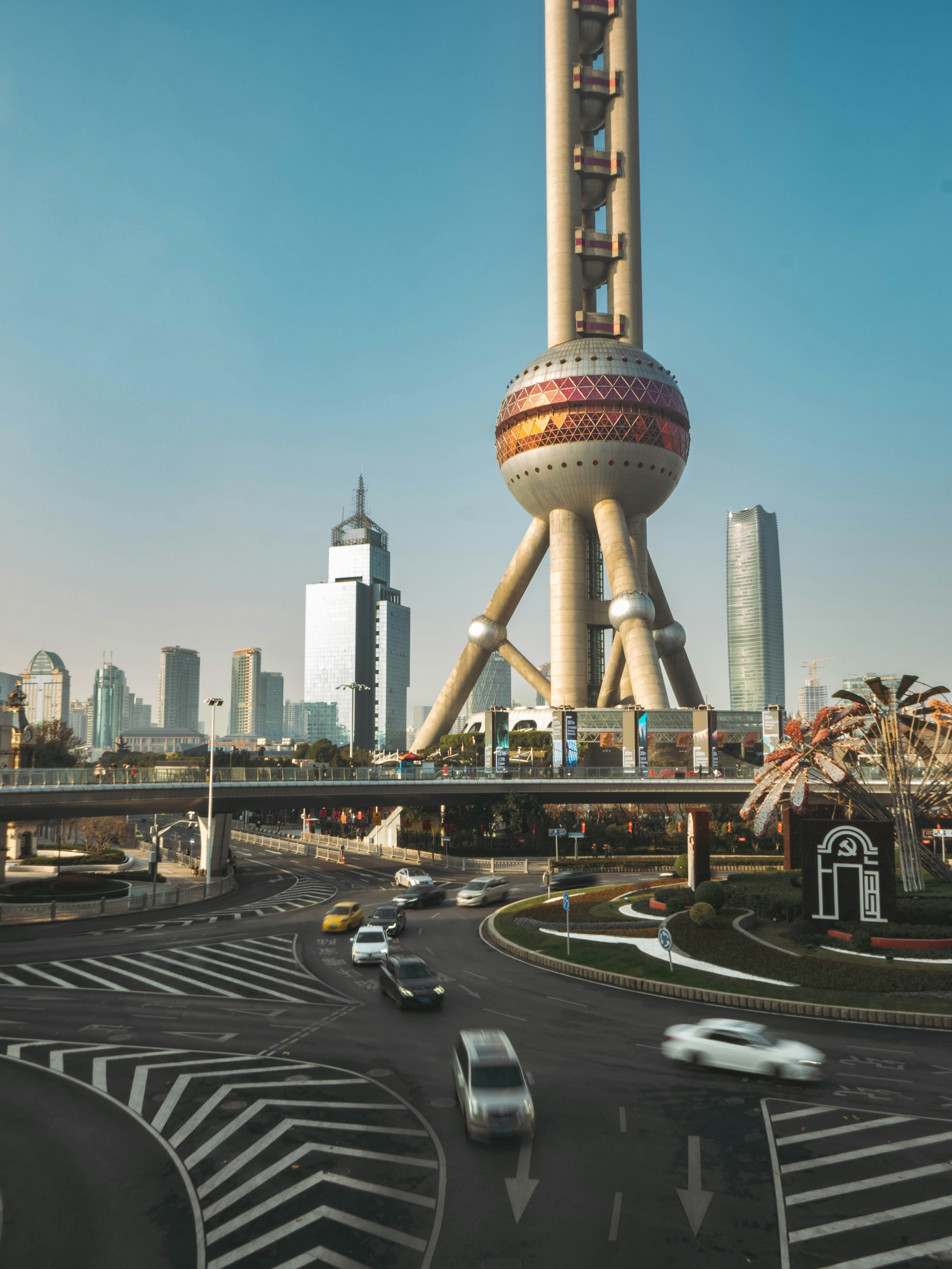 A very tall building with a very tall tower in the background photo ...