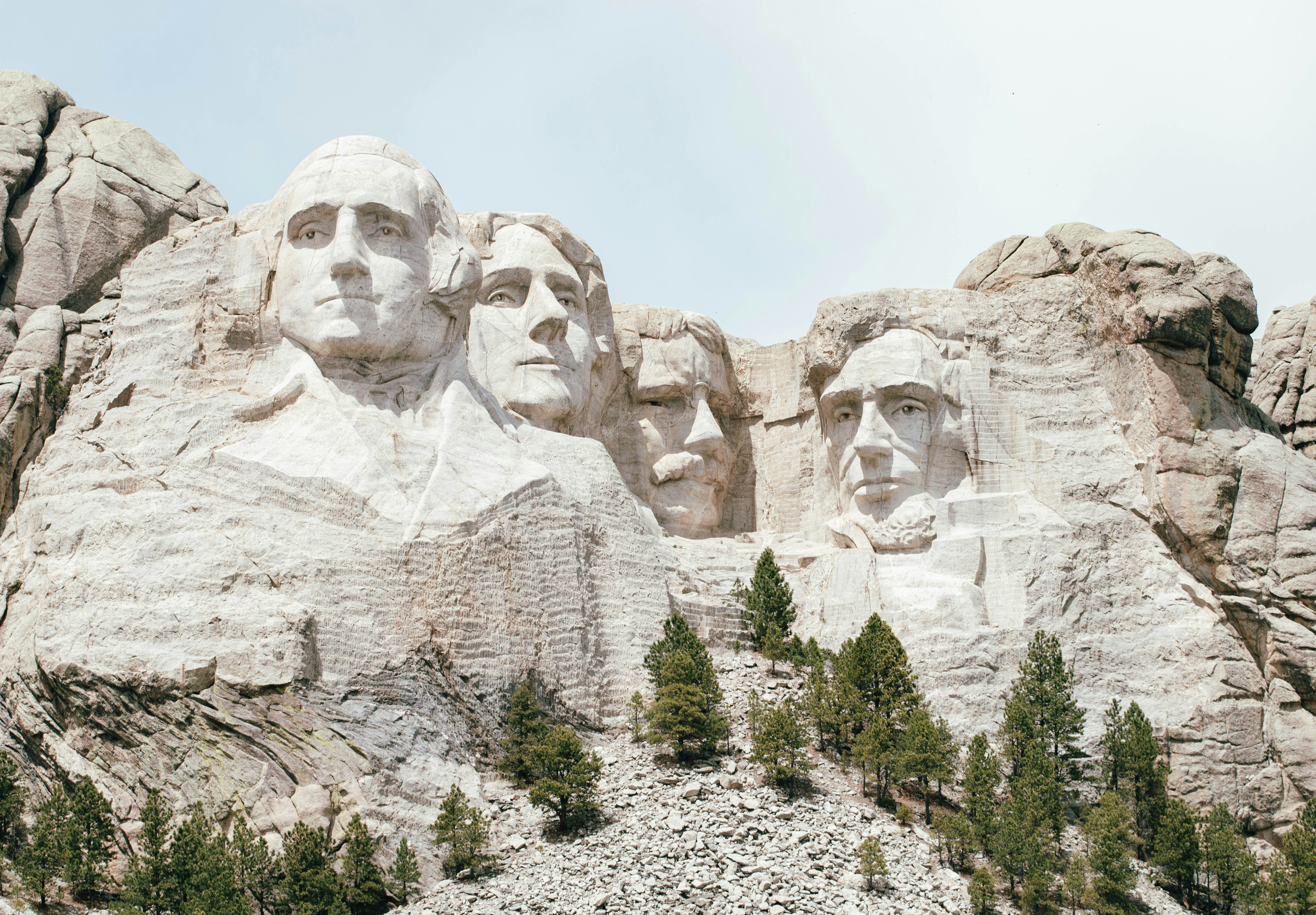 A group of presidents carved into the side of a mountain photo – Free ...