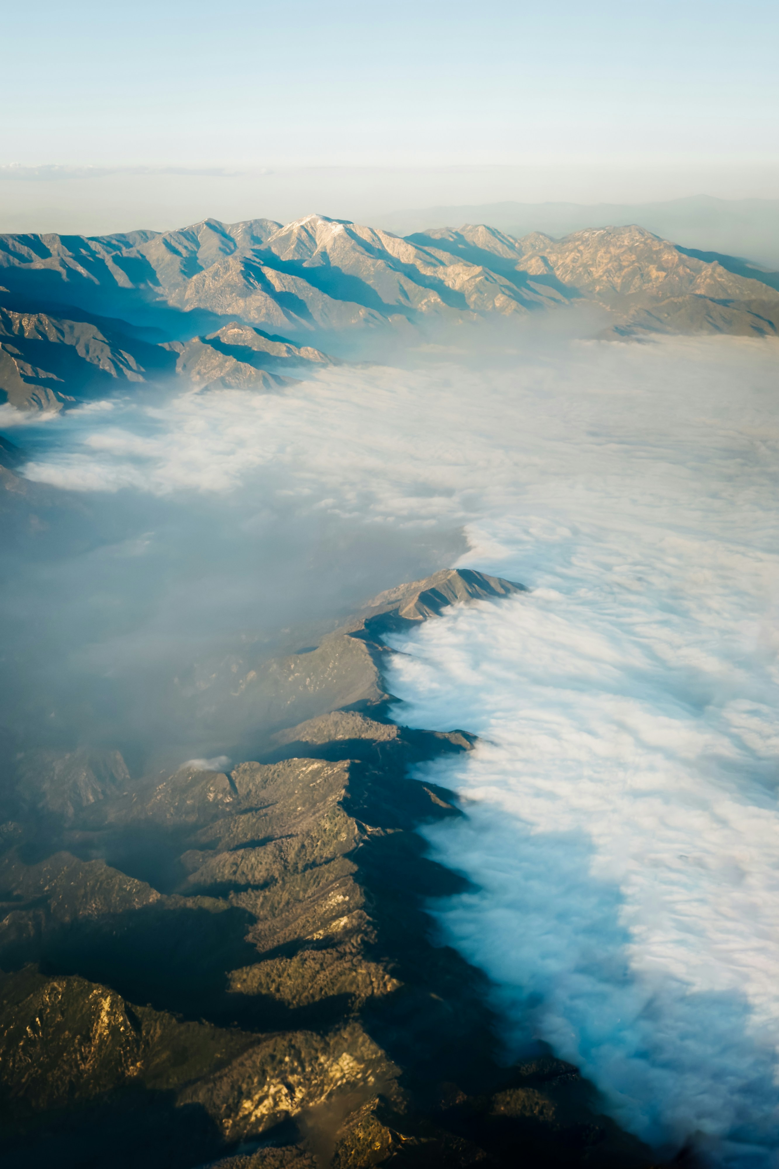 A view of a mountain range from an airplane photo – Free Mount baldy ...