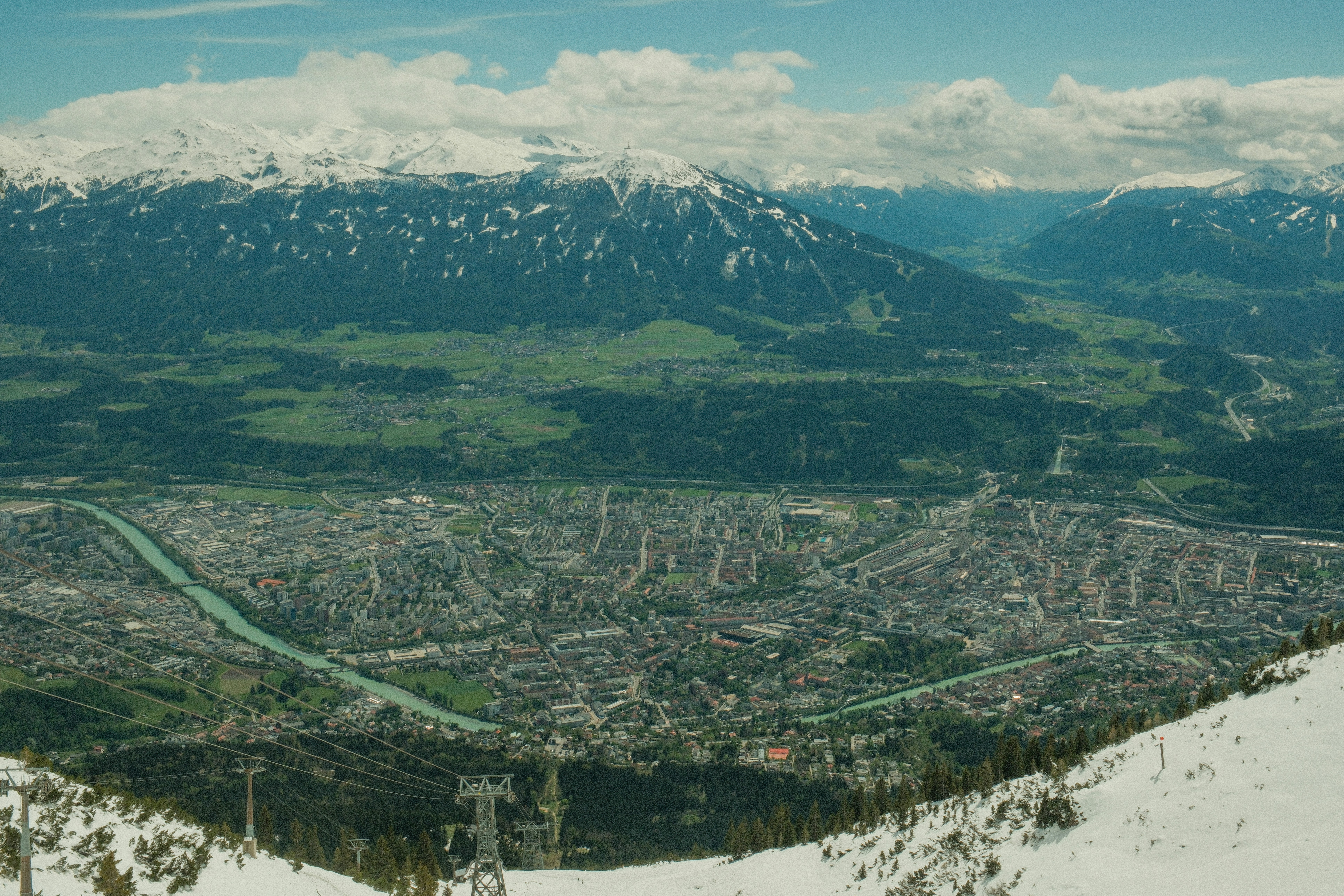 a view of a city from the top of a mountain