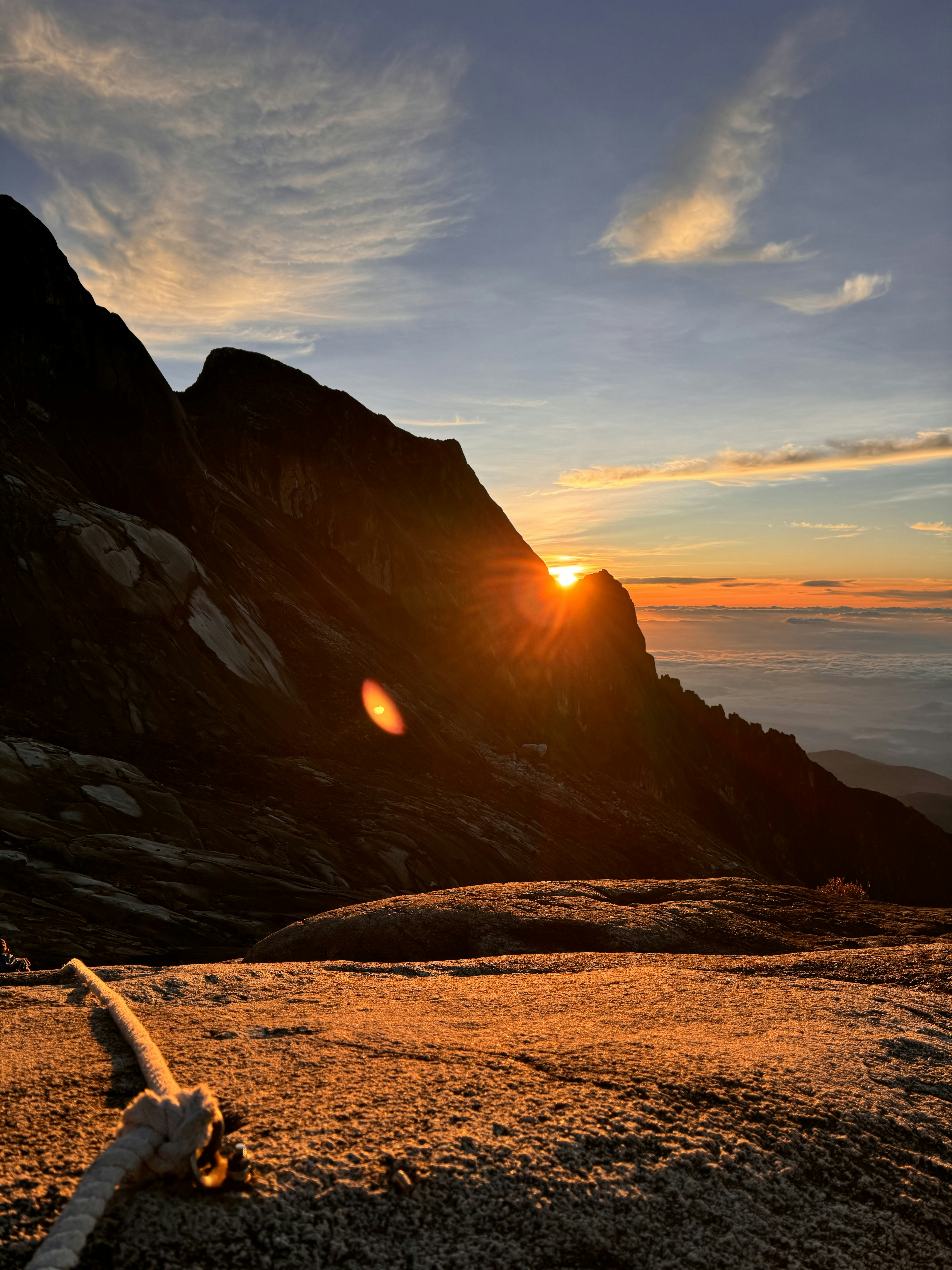 I love watching a sunrise and watching the sky turn all kinds of color. The only thing making it better? Watching it from a mountain top (or in this case the side of a mountain)!