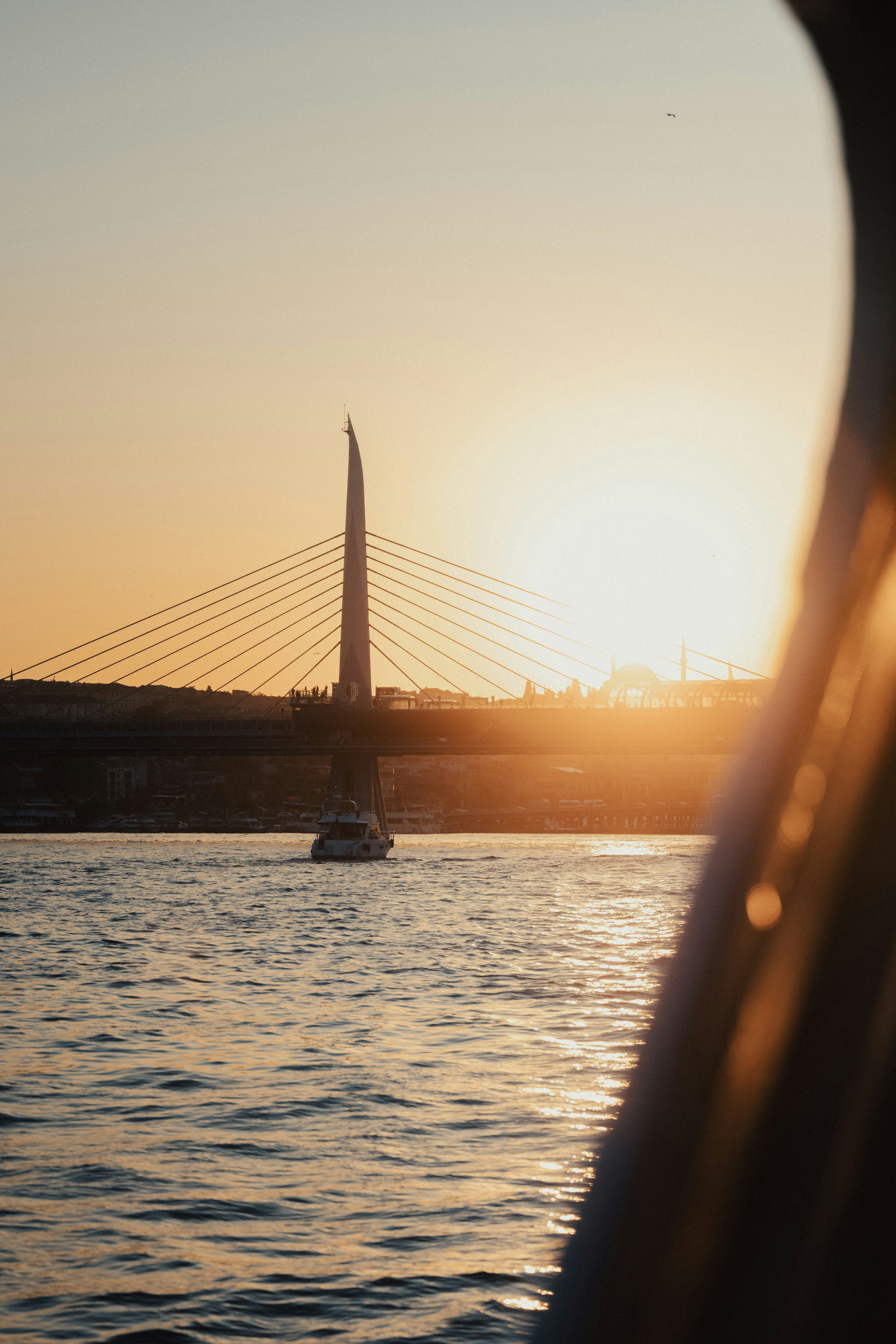 Golden Hour Pylon: Sunset Framing a Cable-Stayed Bridge