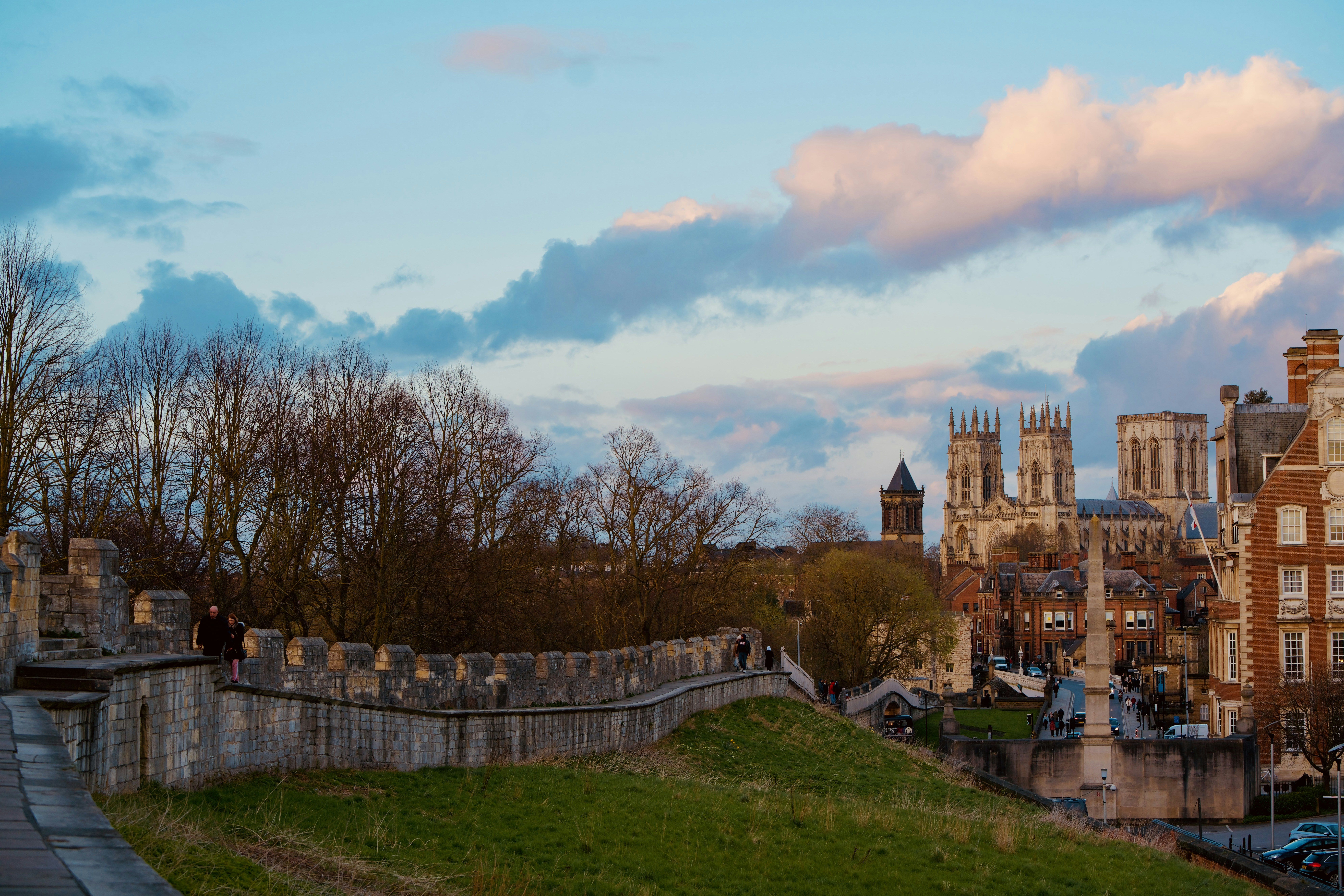 Evening Along York's City Walls: Spires Rise Over the River