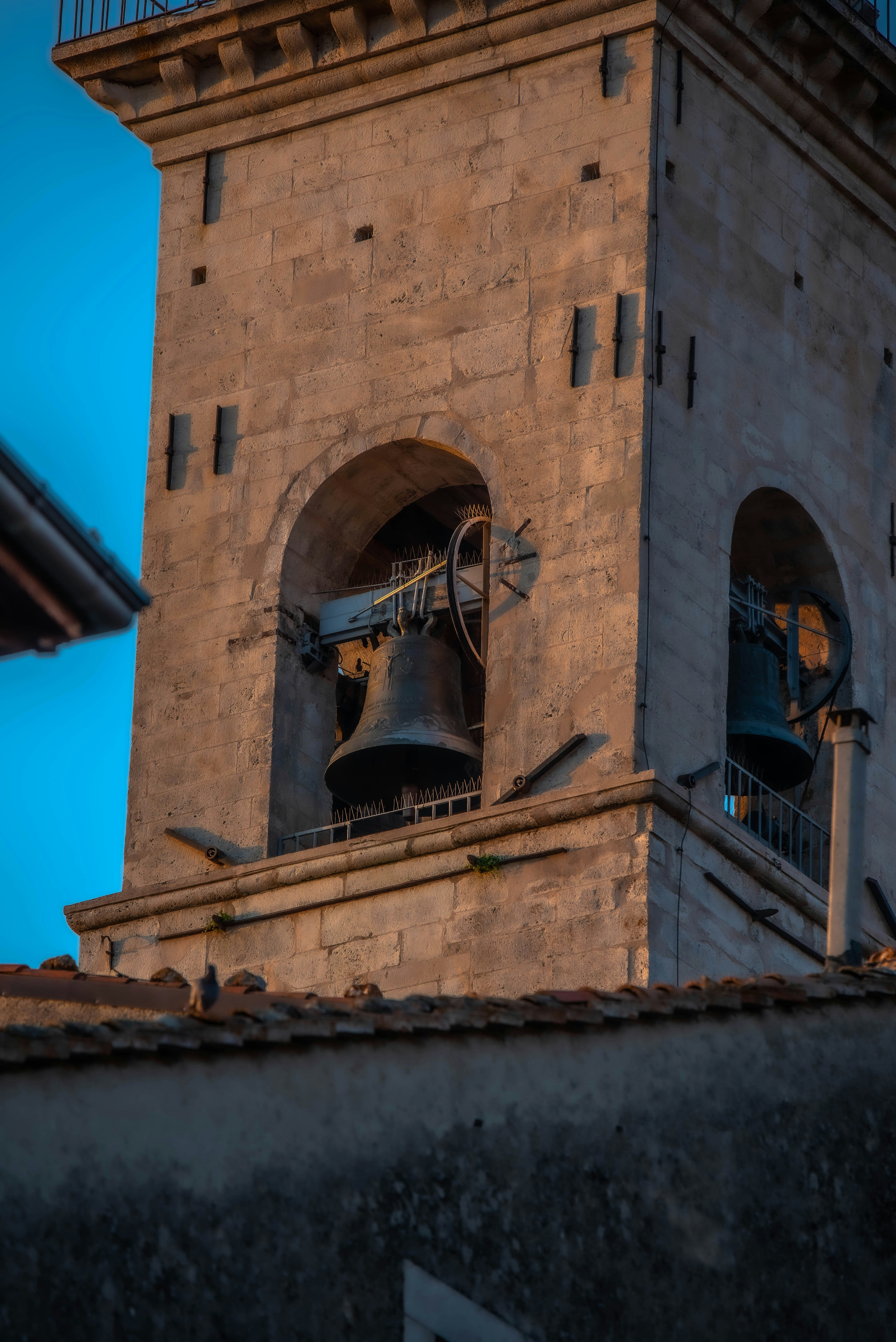 Bronze Echoes in a Sunlit Bell Tower